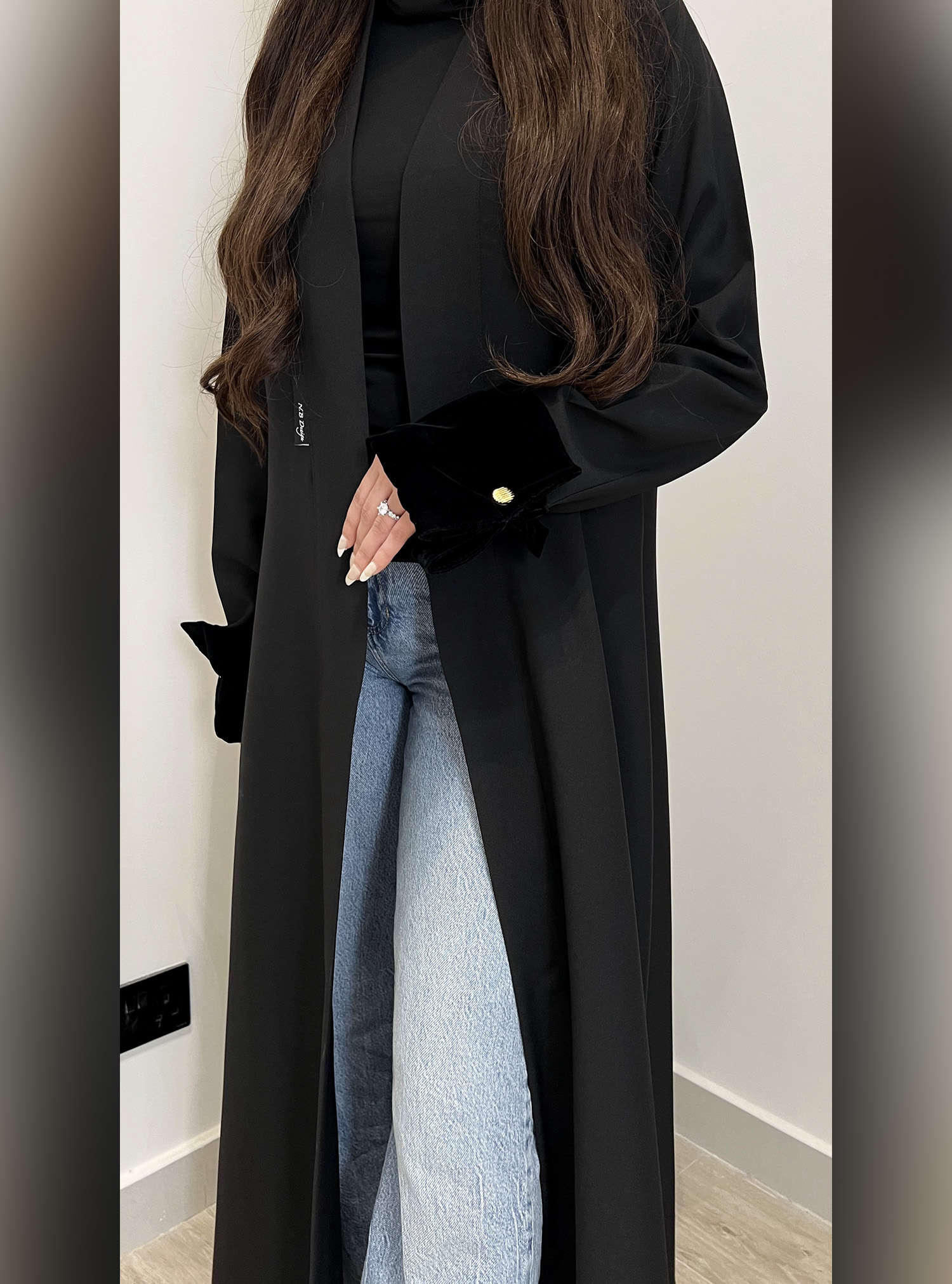 Velvet Grace Chic winter black abaya with velvet cuff details and a ...