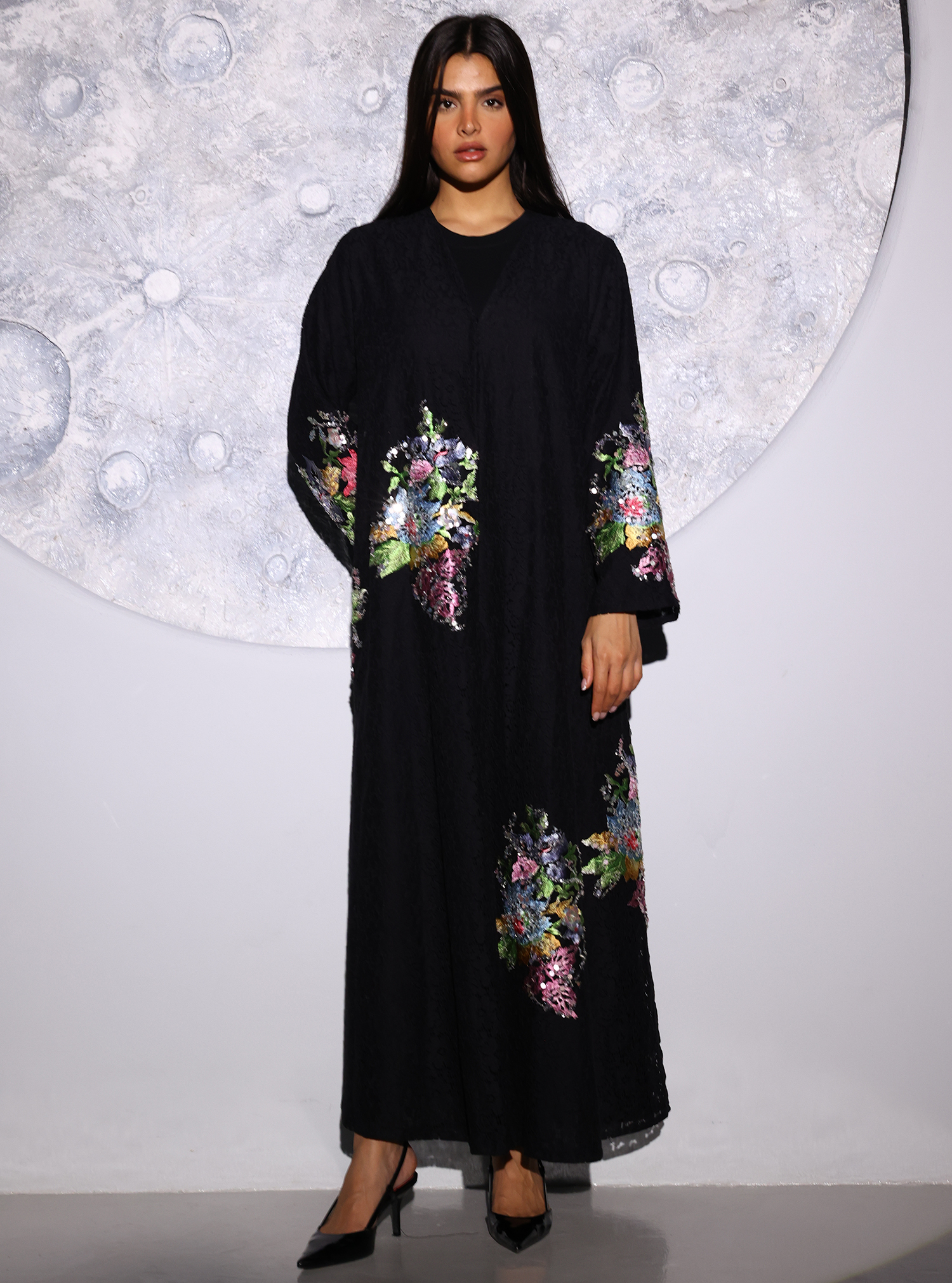 W 150 Elegant black abaya with colorful floral embroidery on the ...