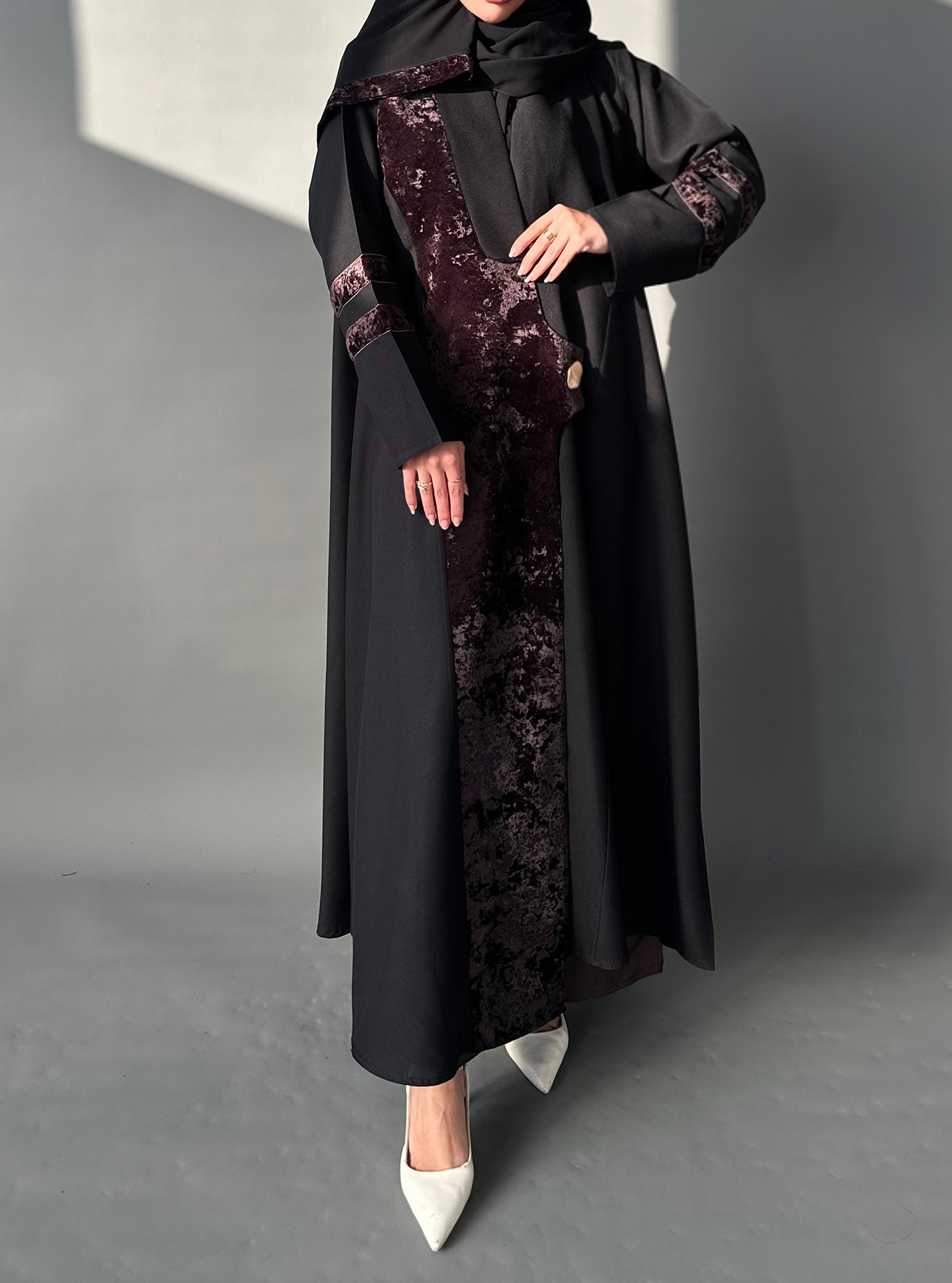 Velvet abaya Crafted from mini-matt fabric, featuring velvet accents ...