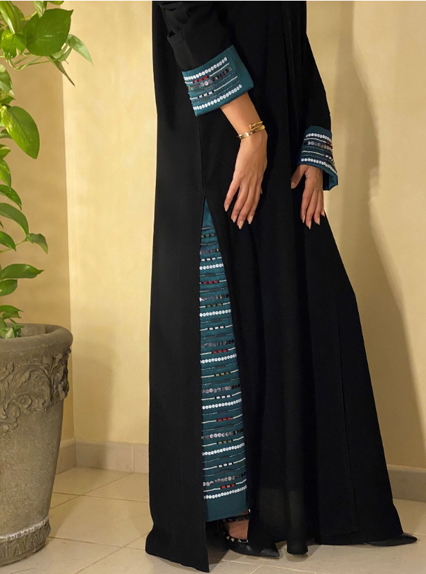 Colored Abaya Colorblock abaya featuring a contrast aqua sleeve cuff ...