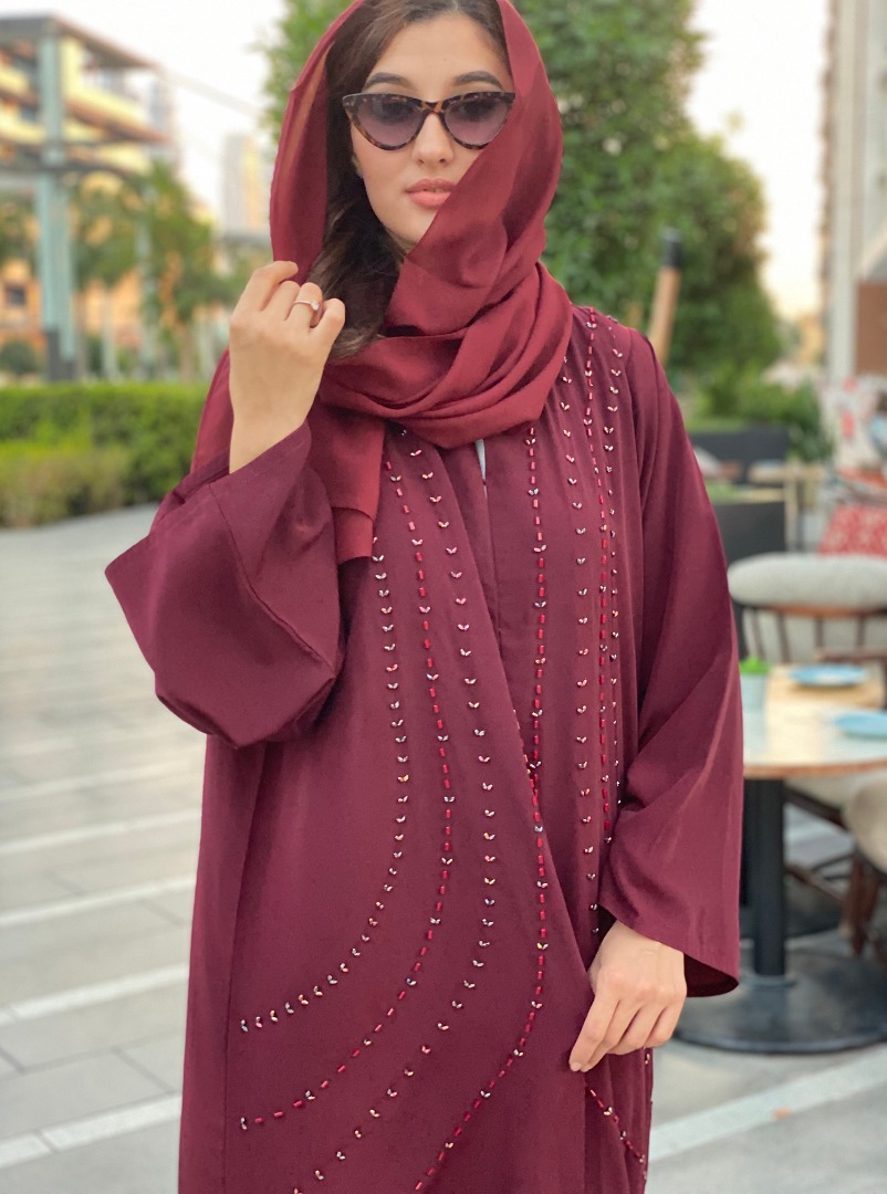 Maroon Abaya Maroon abaya decorated with multi-colored beadwork. Comes ...