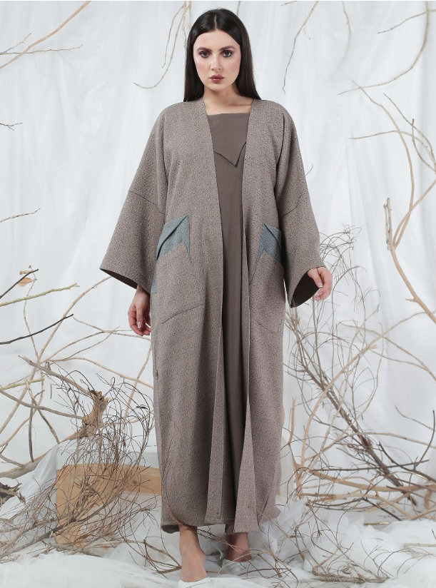 MKA - W20C06 Brownish thick abaya featuring 2 front pockets with contrast patches. Suitable for ...