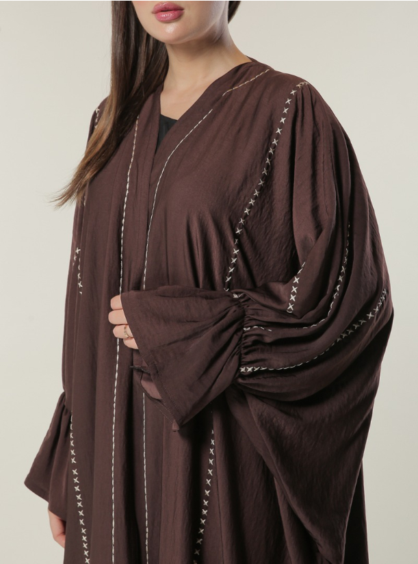 Brown Abaya Brown Abaya with peasant sleeves and contrast stitching. Abayas from Moistreet at Boksha