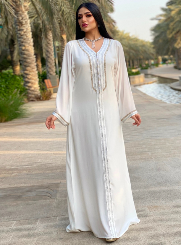 White Jalabiya White Moroccan jalabiya adorned with silver trimmings ...