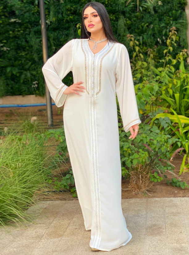 White Jalabiya White Moroccan jalabiya adorned with silver trimmings ...