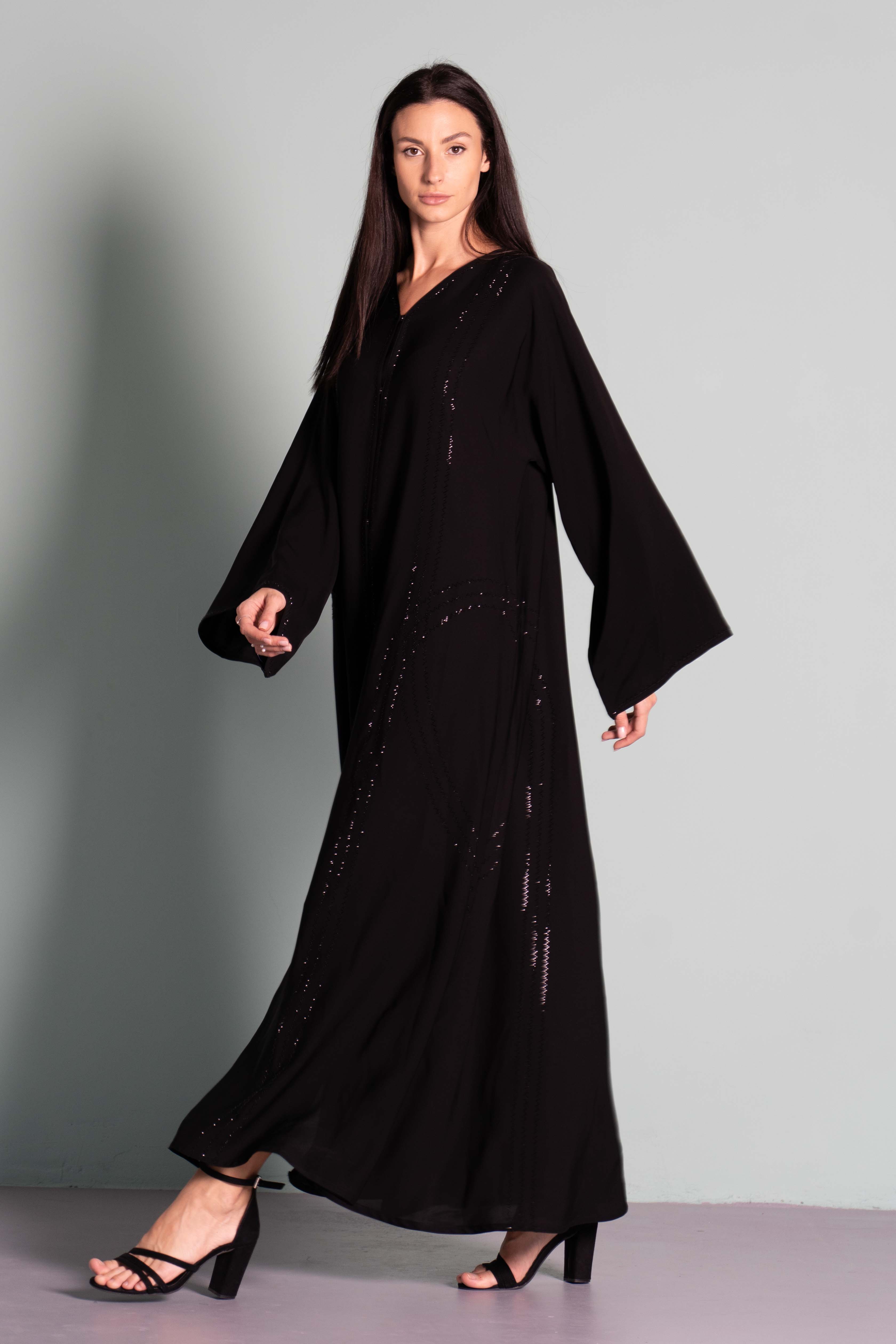 NIDHA BLACK Black abaya with dainty embellishments. Comes with a ...