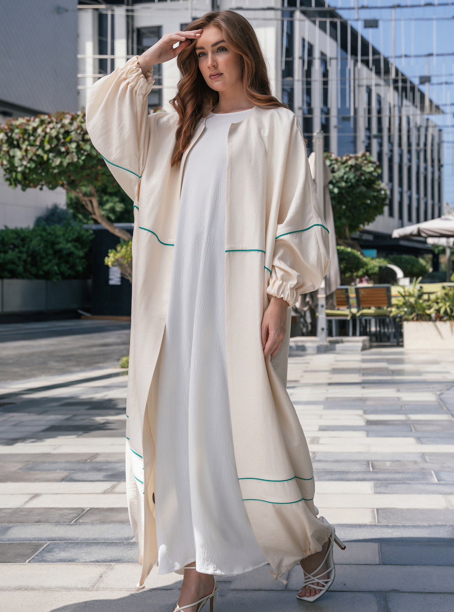 R.T abaya Cream casual abaya with elastic puffy sleeves and green ...