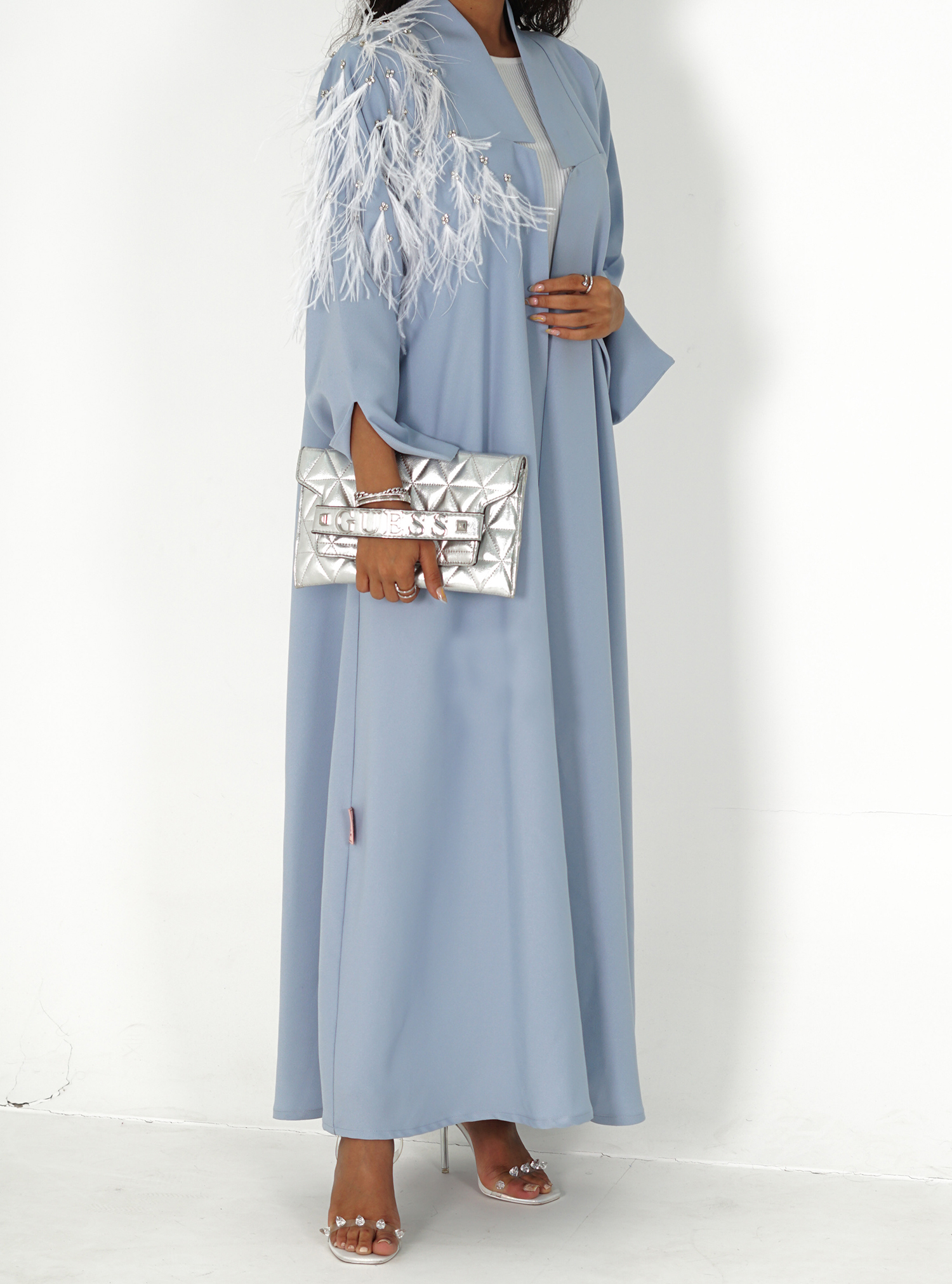 Feather abaya Elegant light blue Abaya with feather appliques adorned ...