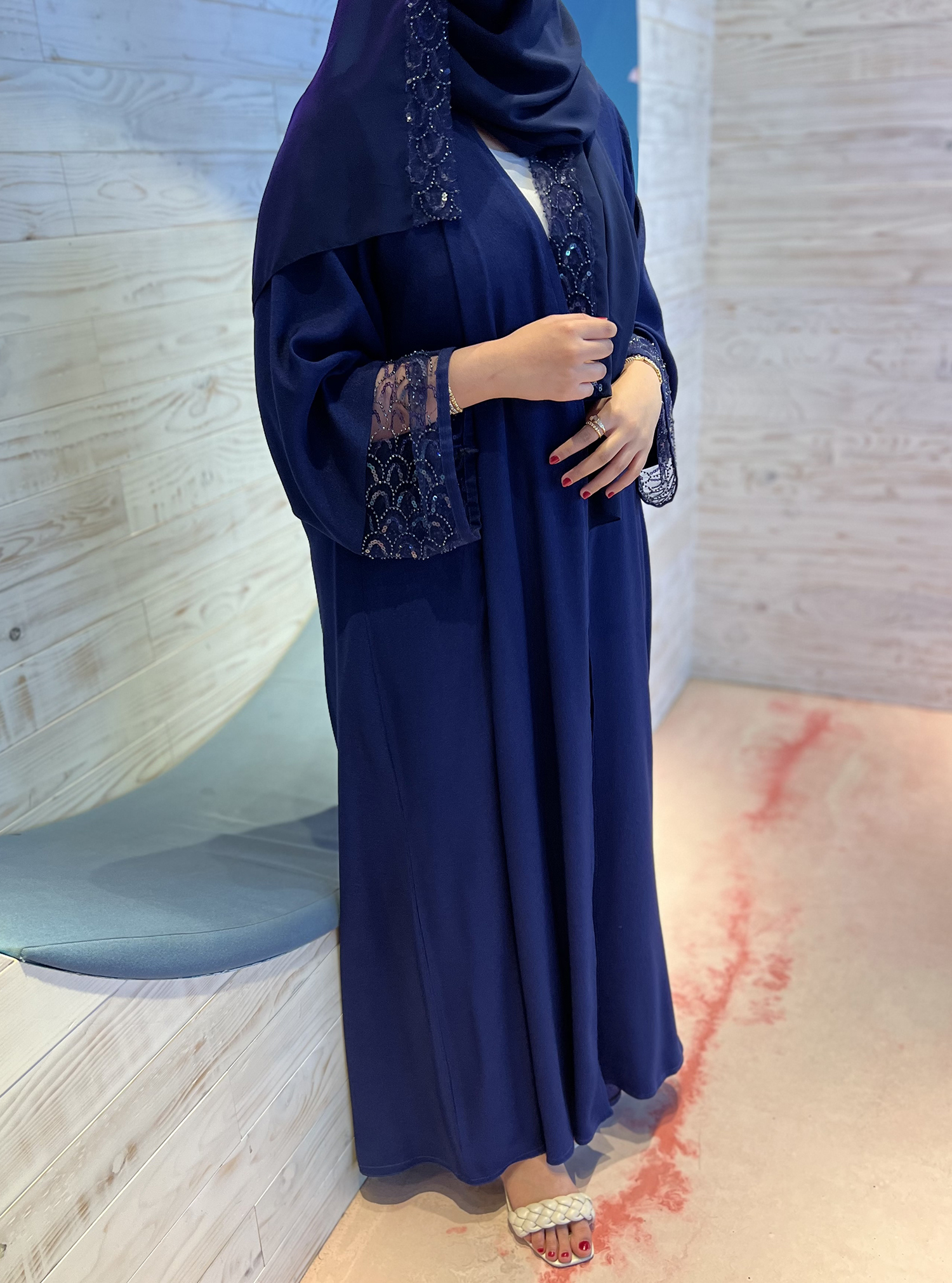 Blue Abaya Blue abaya adorned with embellished sleeve trimmings. Comes ...