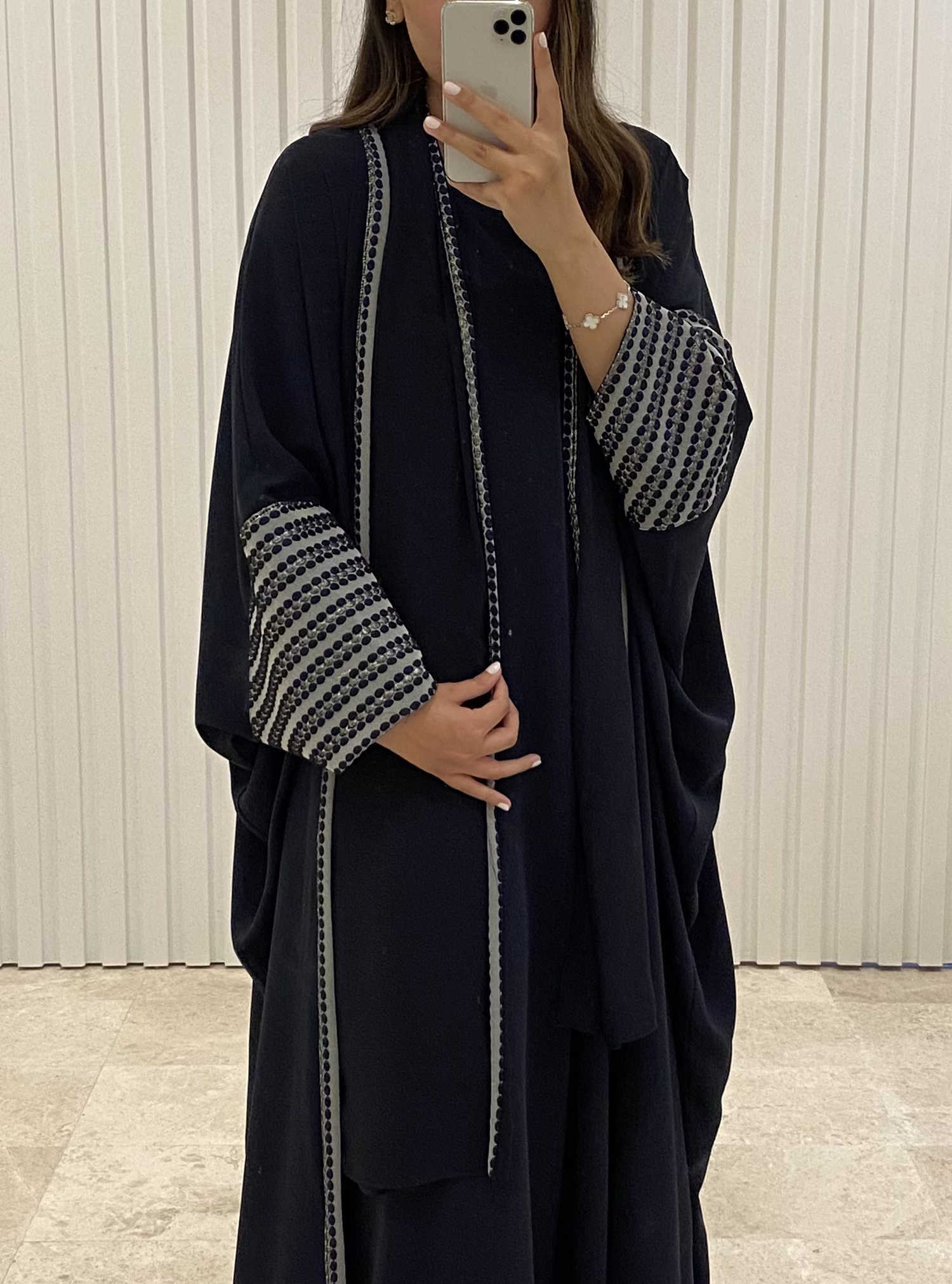 Navy Abaya 05 Navy blue abaya with patterned trimmings. Comes with a ...
