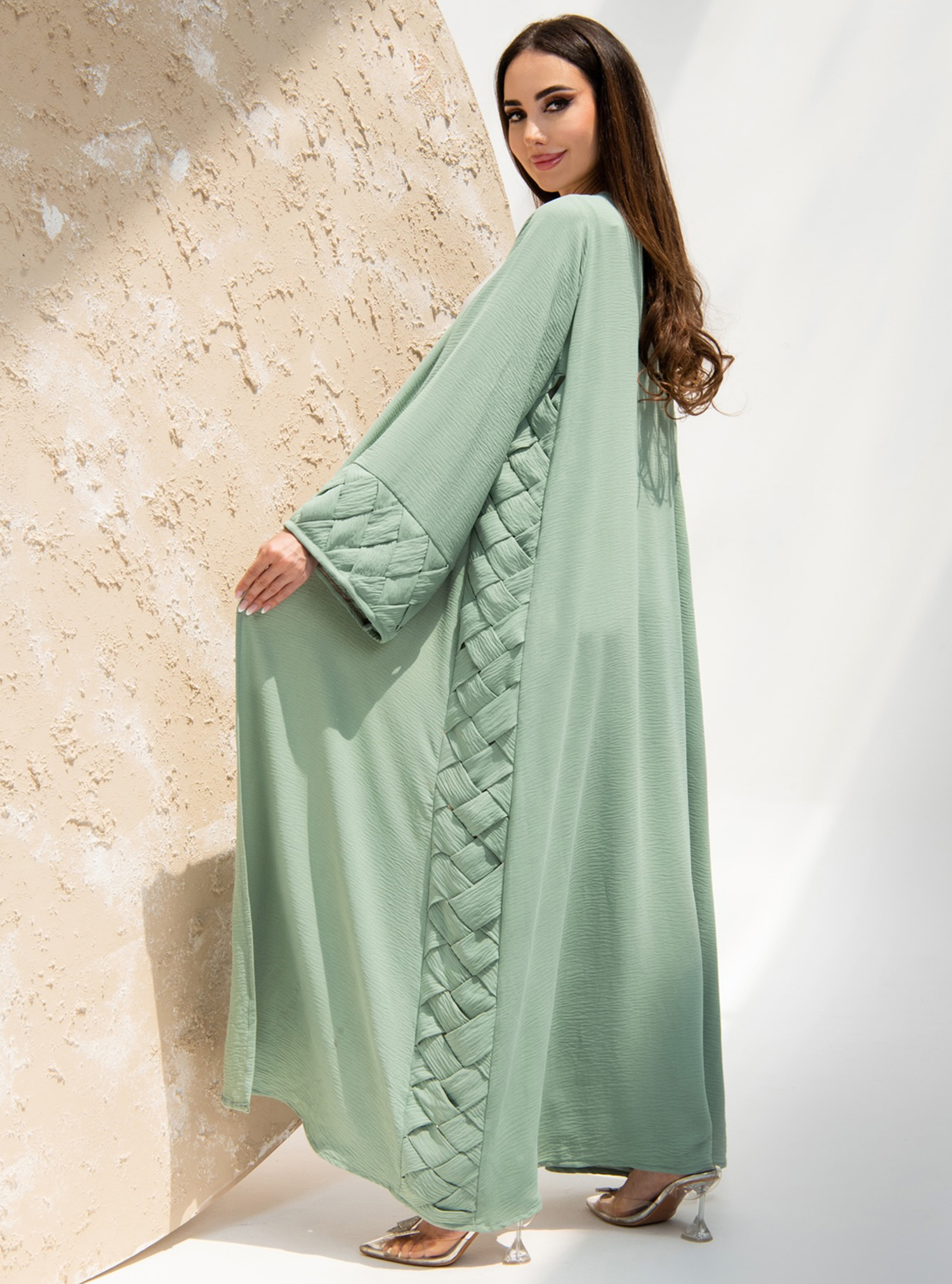 Beryl Abaya Beryl green abaya, features a weave-trimmed design. Comes with a matching headscarf ...