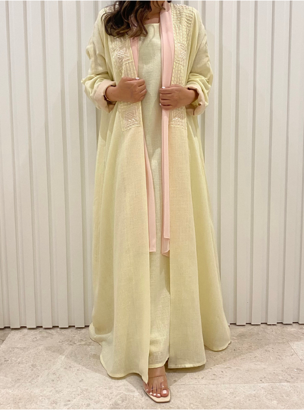 Yellow Abaya 13 Light yellow abaya with light pink embroidered neckline ...