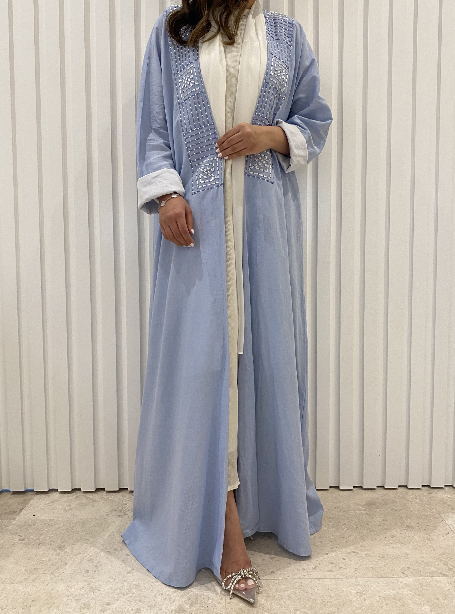 Blue Abaya 15 Light blue abaya with embroidered neckline. Comes with a ...