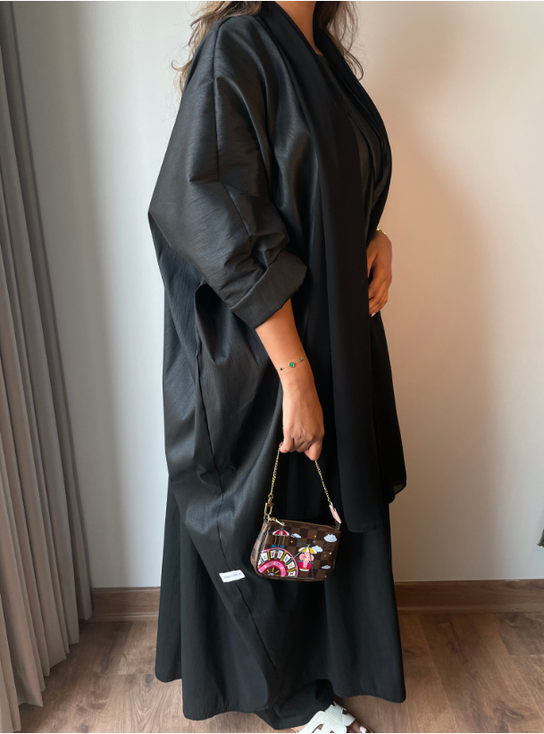 Black Bisht Classic black bisht abaya with oversized fot. Comes with a ...