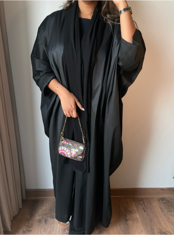 Black Bisht Classic black bisht abaya with oversized fot. Comes with a ...
