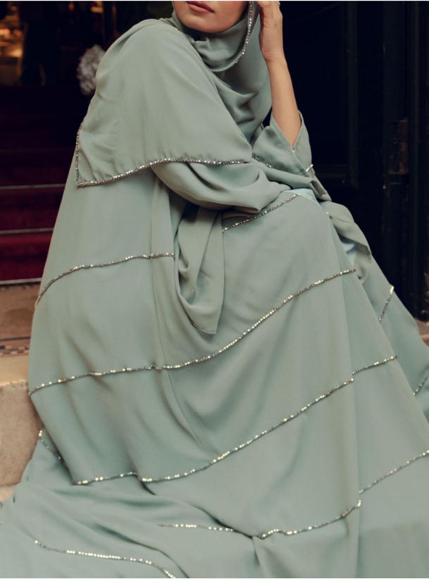 NOA58812 Abaya Blue grey Abaya adorned with rows of embellishments. Comes with a headscarf ...