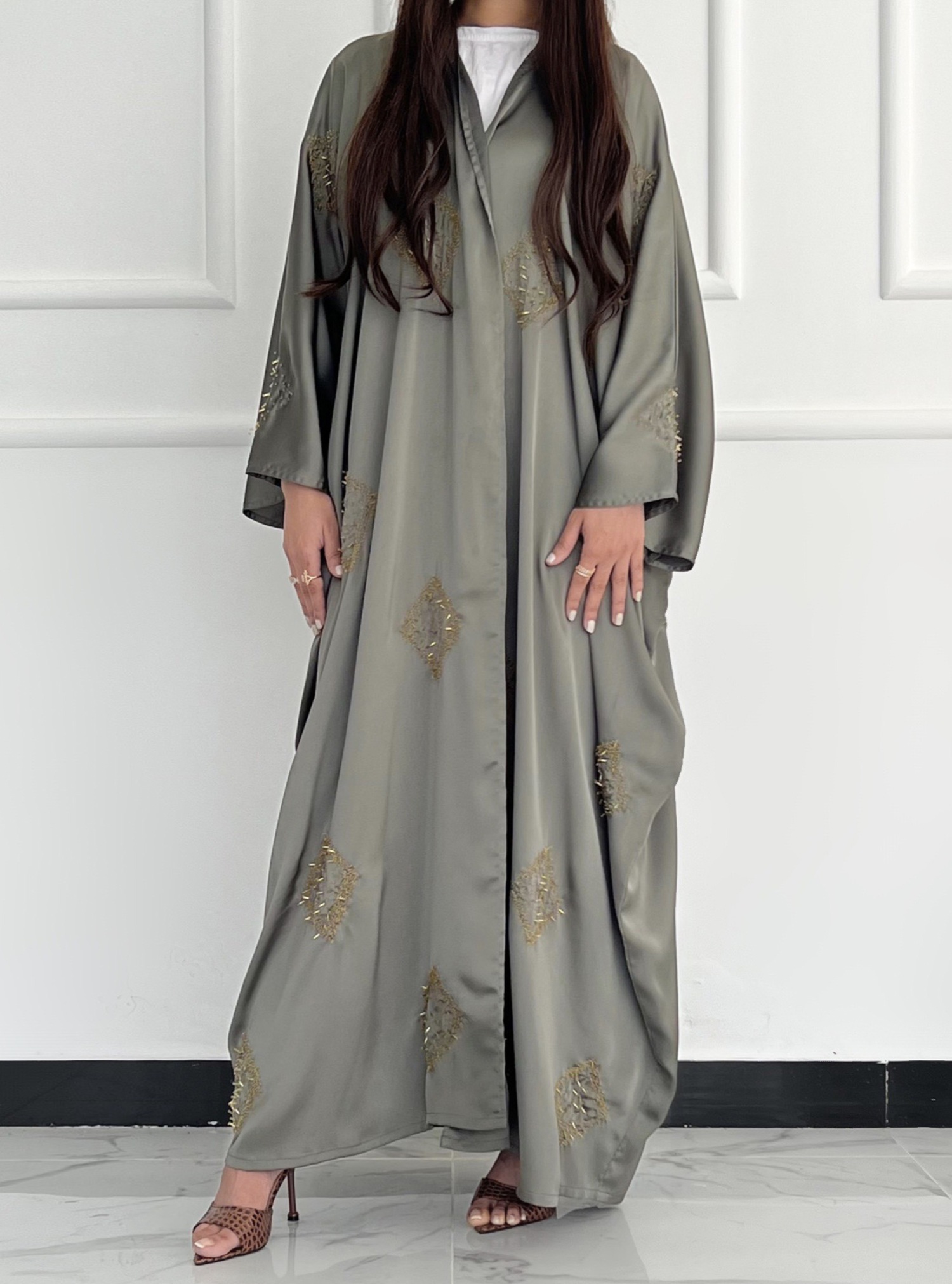 Embroidery Light olive embroidered abaya adorned with gold colour ...