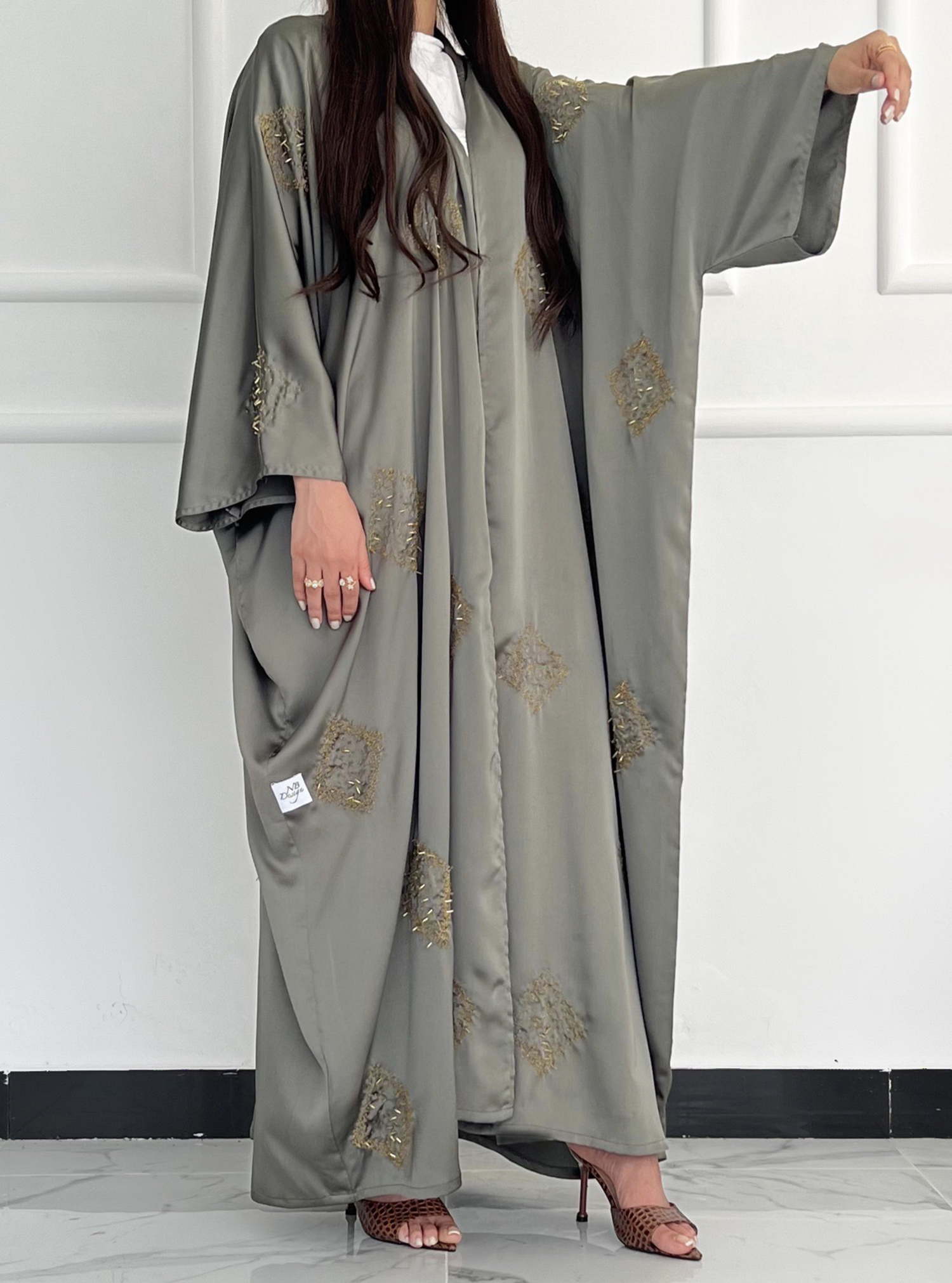 Embroidery Light olive embroidered abaya adorned with gold colour ...