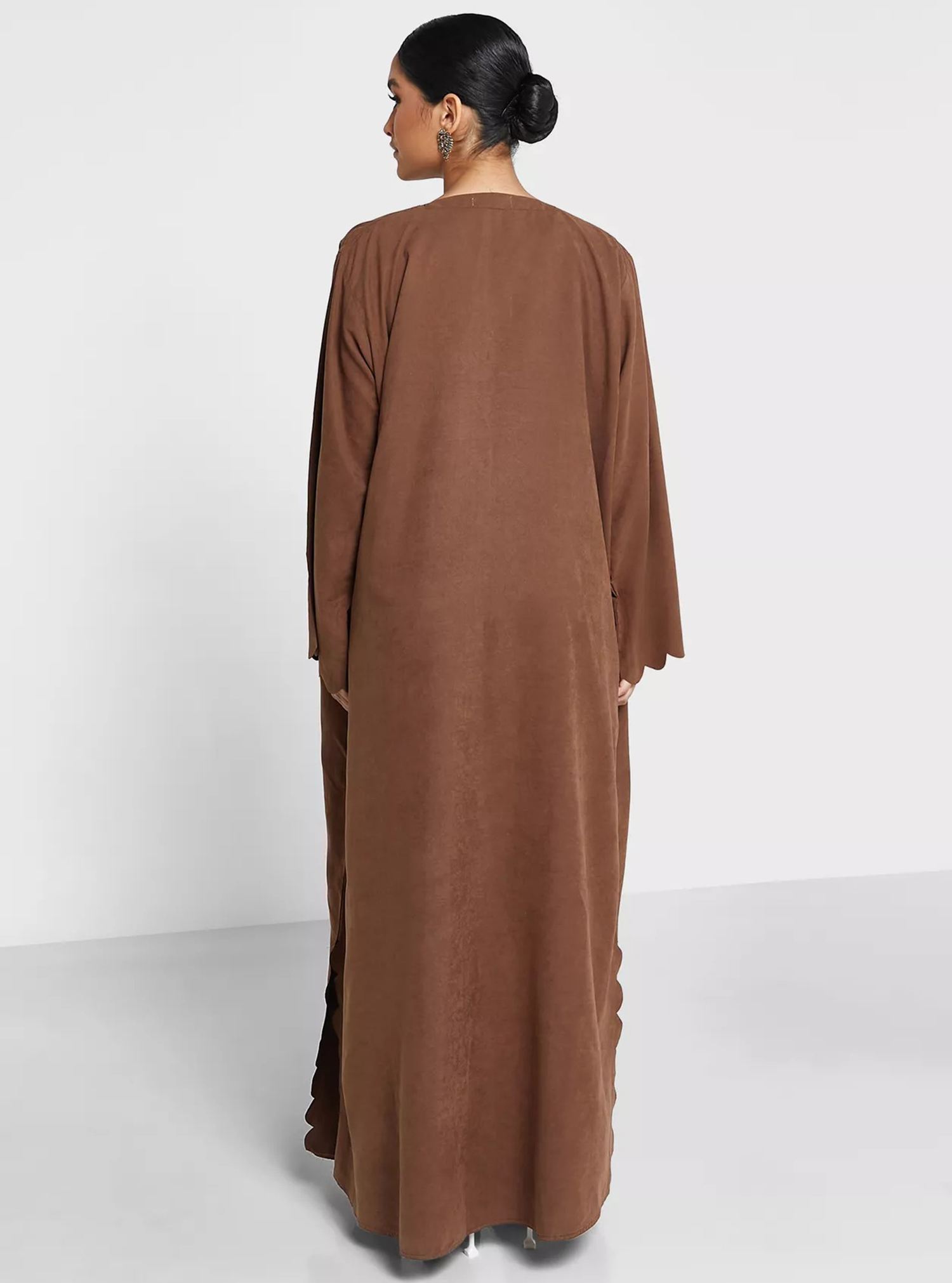 L01 Brown Abaya Brown abaya with scallop trimmings. Comes with matching headscarf. Abayas from ...