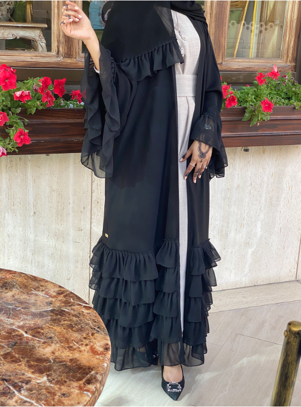 Layers abaya Black abaya with tiered ruffle details. Comes with a ...