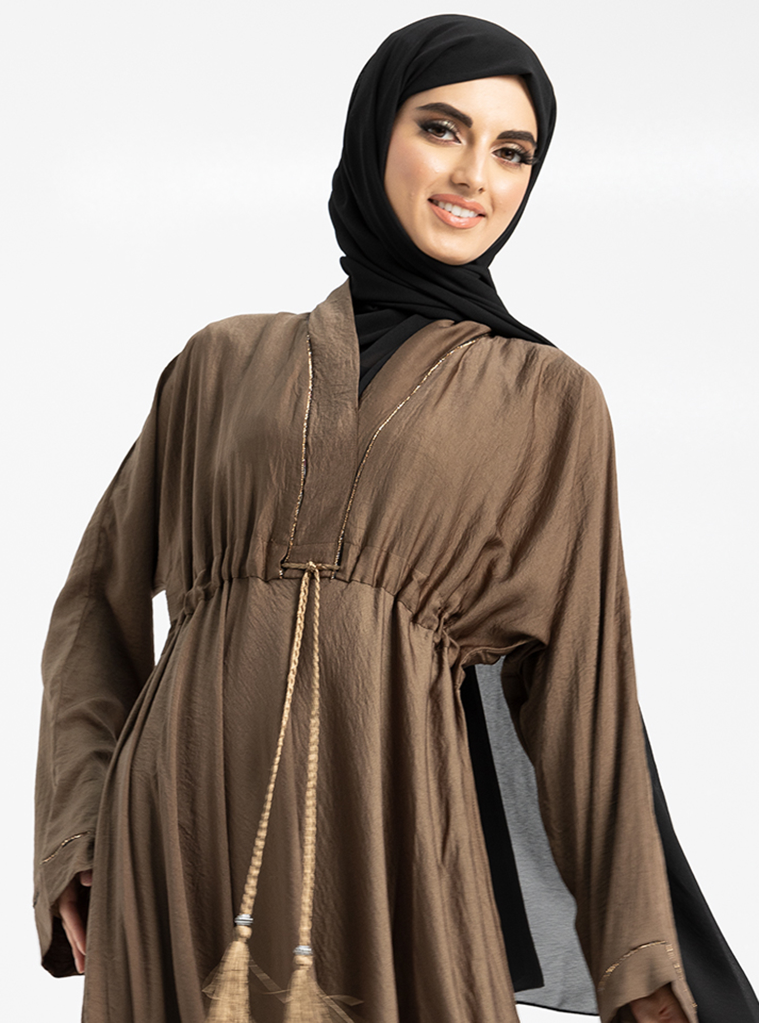 NOA58845 Simple light brown closed abaya with Waist Tie. It comes with a matching headscarf ...