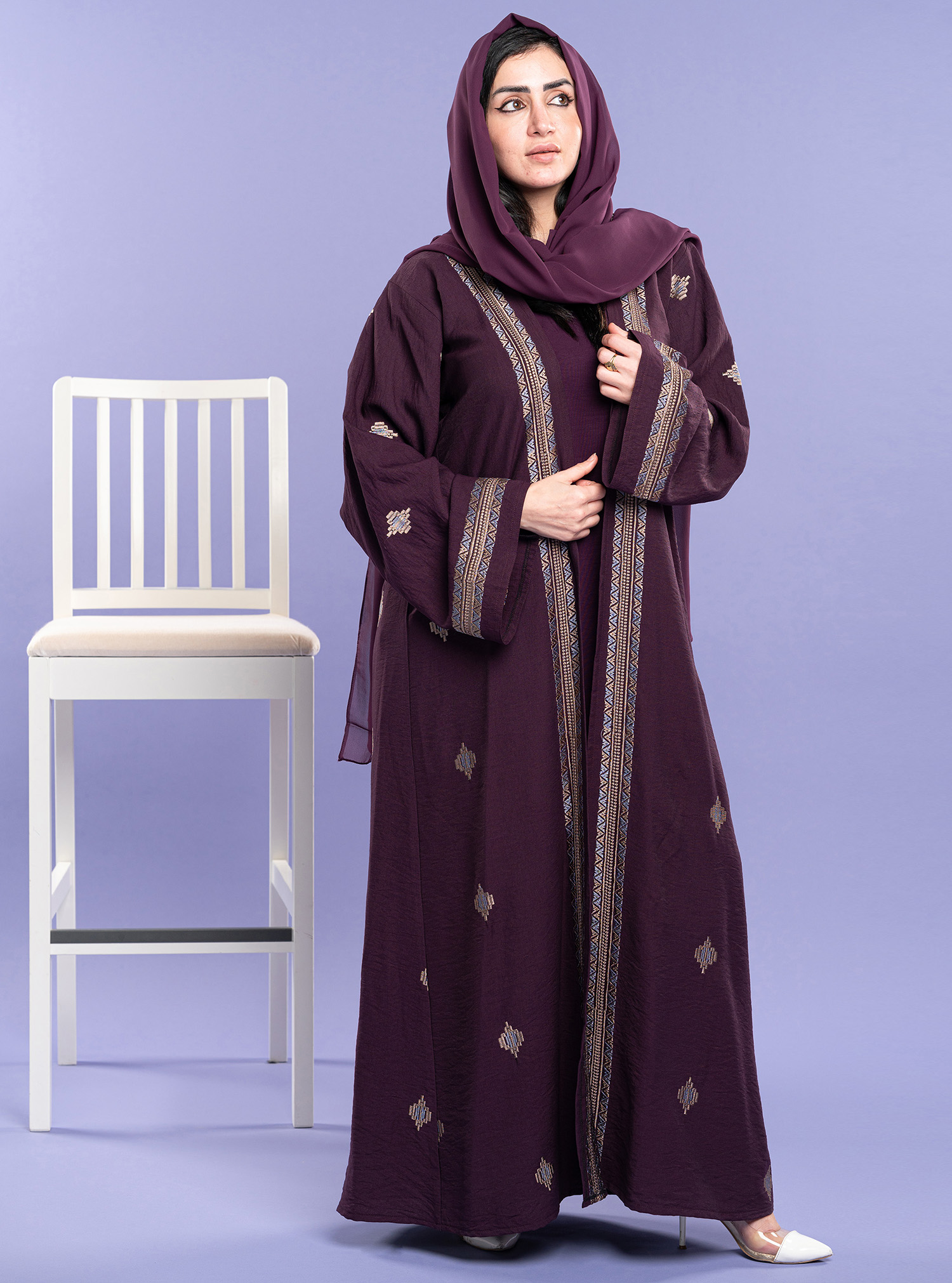 PURPLE SET Purple Abaya Set with traditional embroidery. Comes with a matching inner dress and ...