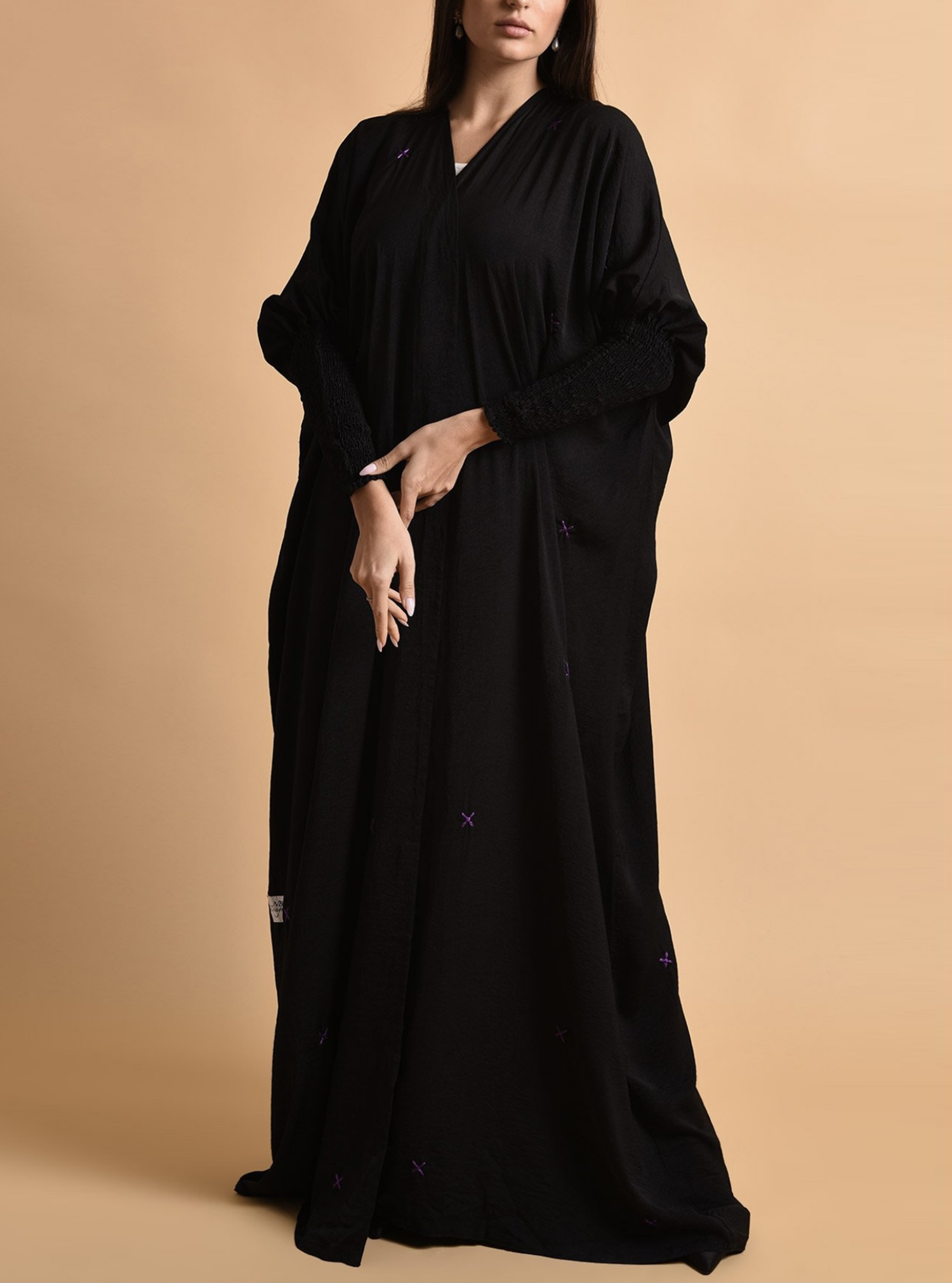 Black vs Purple Black Abaya with embroidery throughout the abaya, with ...