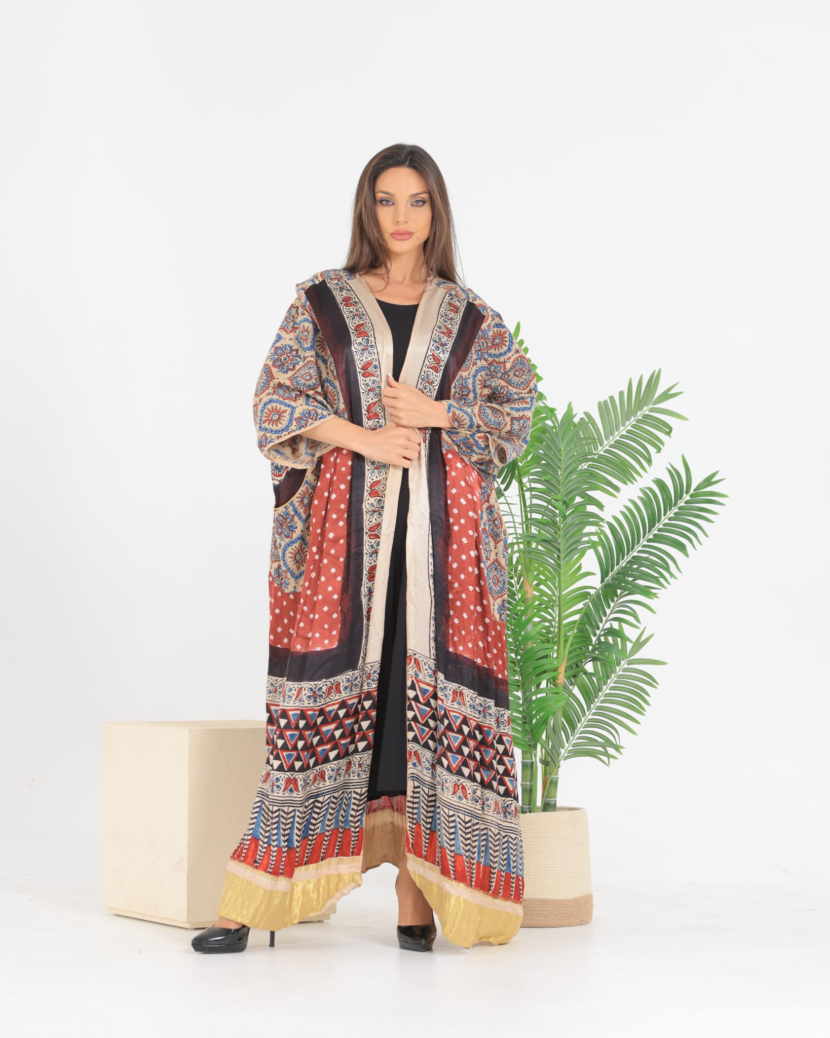 Patterned Abaya Multi-pattern abaya with pouch pockets. Comes with a ...