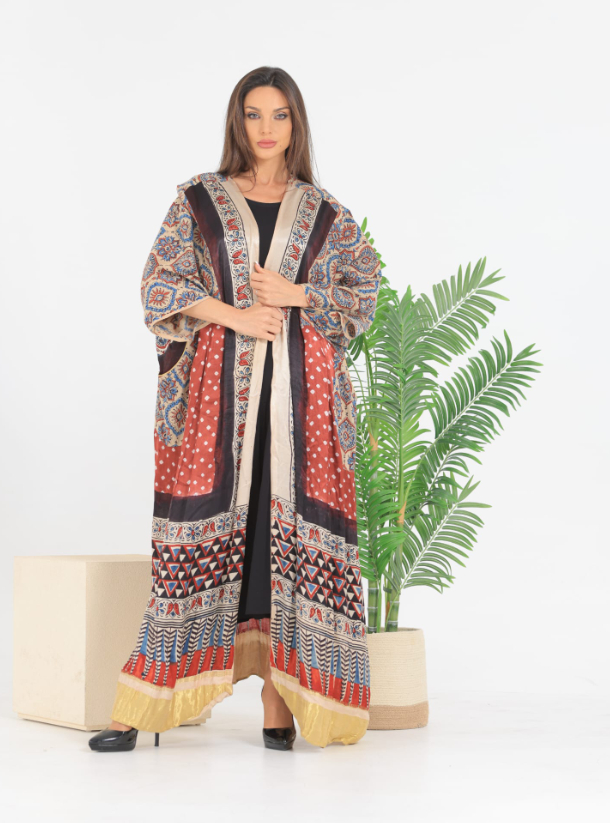 Patterned Abaya Multi-pattern abaya with pouch pockets. Comes with a ...