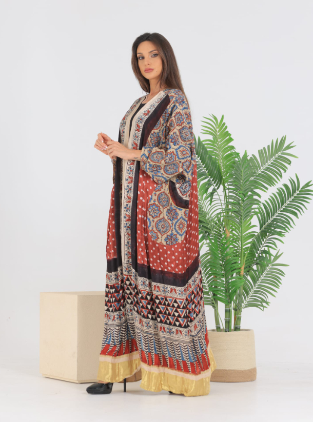 Patterned Abaya Multi-pattern abaya with pouch pockets. Comes with a headscarf. Abayas from ...