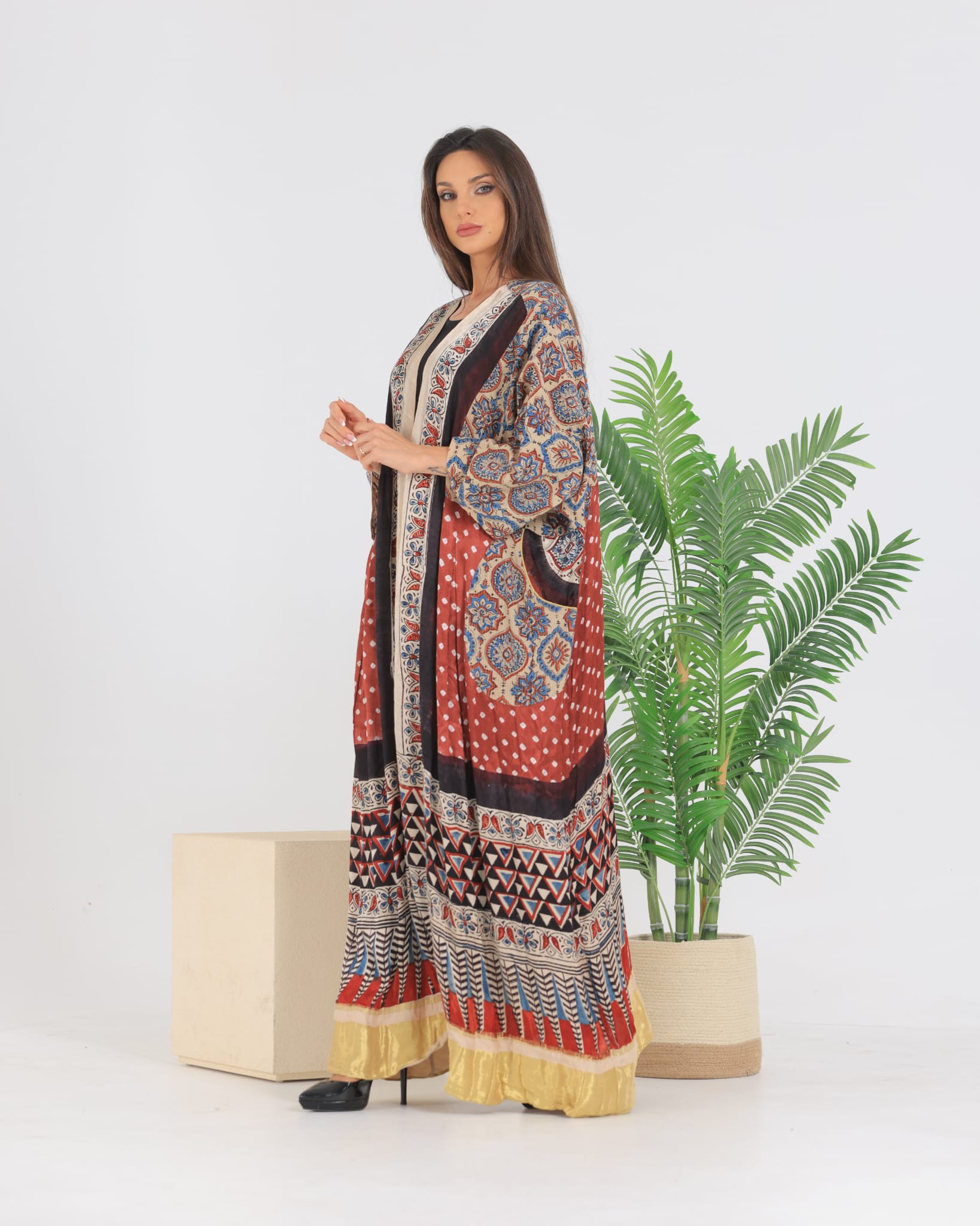 Patterned Abaya Multi-pattern abaya with pouch pockets. Comes with a ...