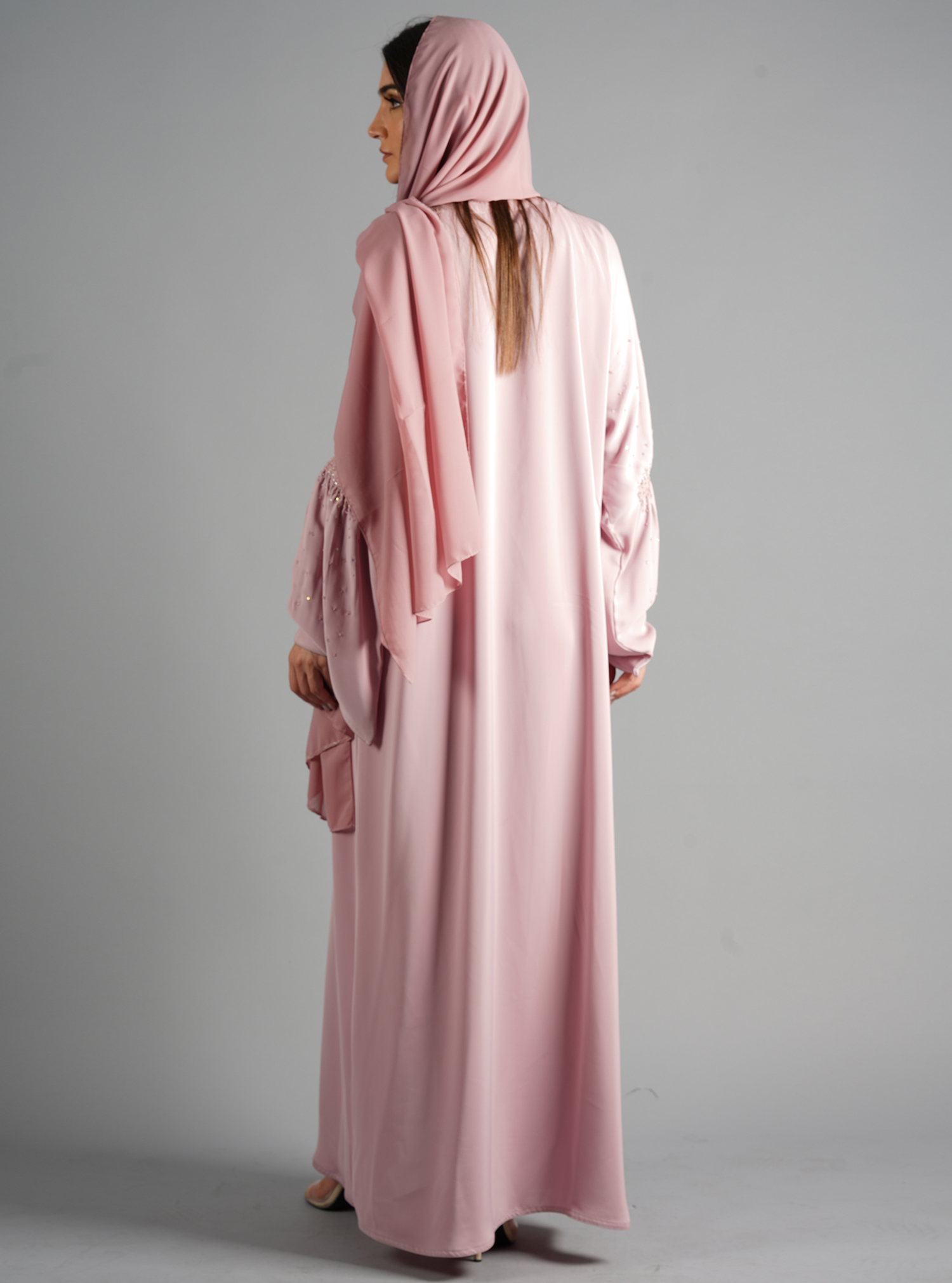 Pink abaya Pink embellished abaya with smocked details. Comes with a ...
