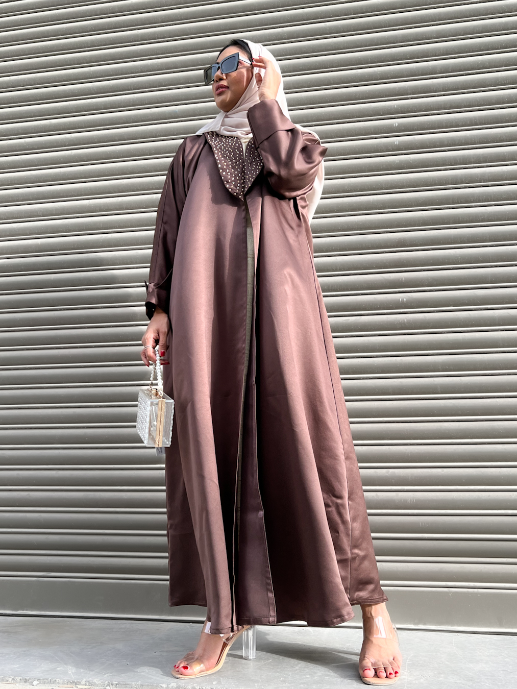 Brown Abaya Brown collared abaya, adorned with embellishments. Comes with a headscarf. Abayas ...