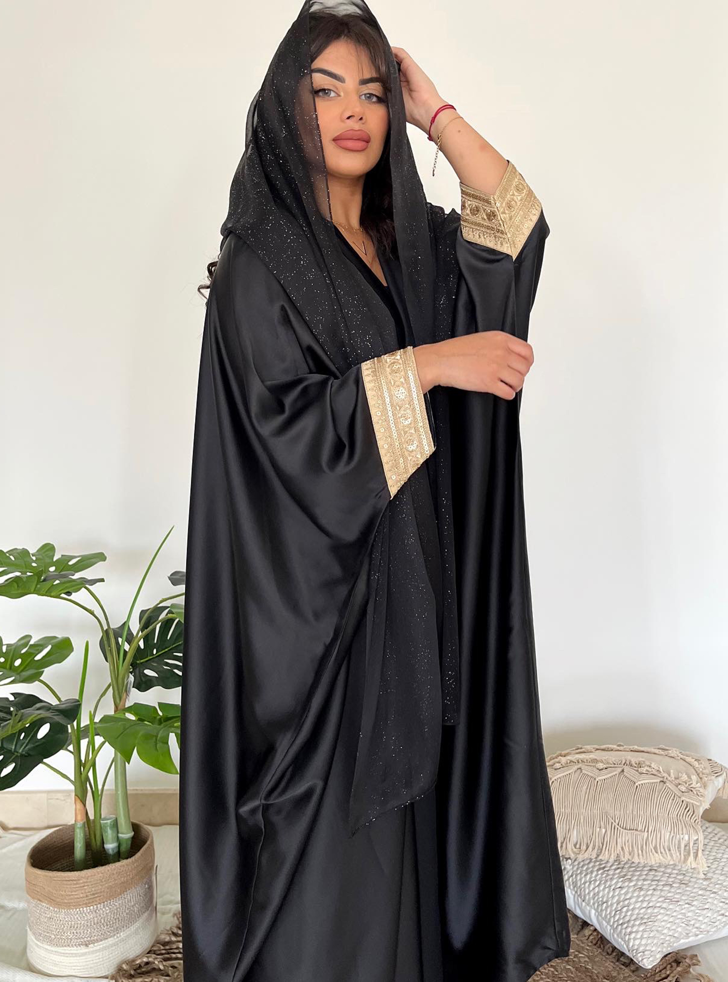 Black glitters Black bisht abaya with sequined sleeve trimmings. Comes ...