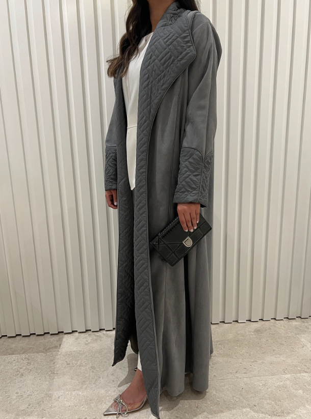 Winter Abaya Grey shamwah abaya featuring quilted details on collar and sleeve cuffs. Comes with ...