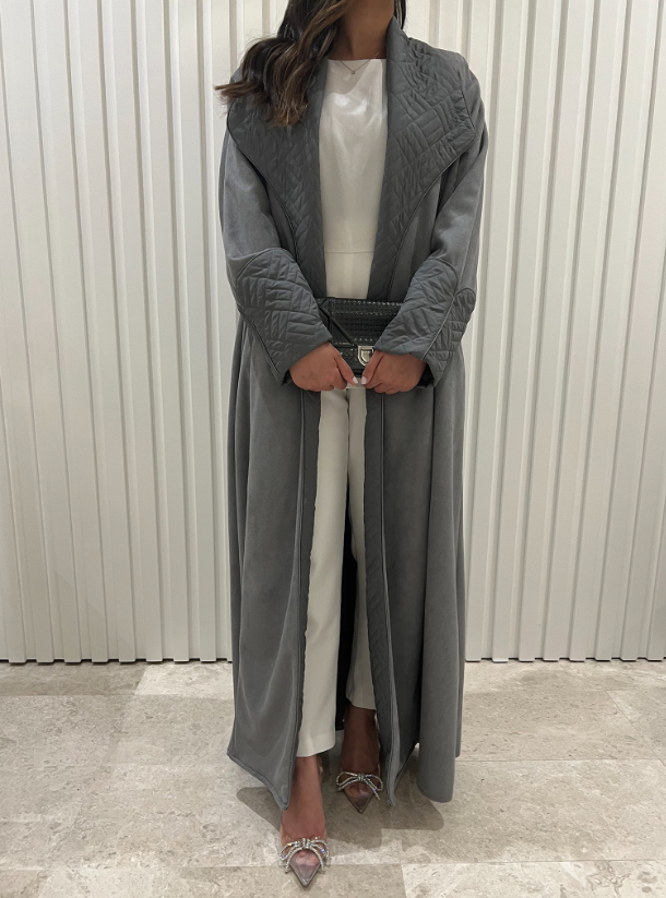 Winter Abaya Grey shamwah abaya featuring quilted details on collar and sleeve cuffs. Comes with ...