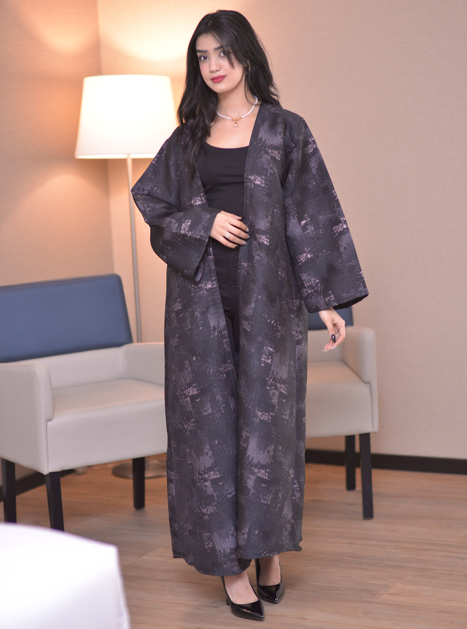 Asmaa Abaya Black textured brocade abaya with abstract gold and silver patterns. Abayas from ...