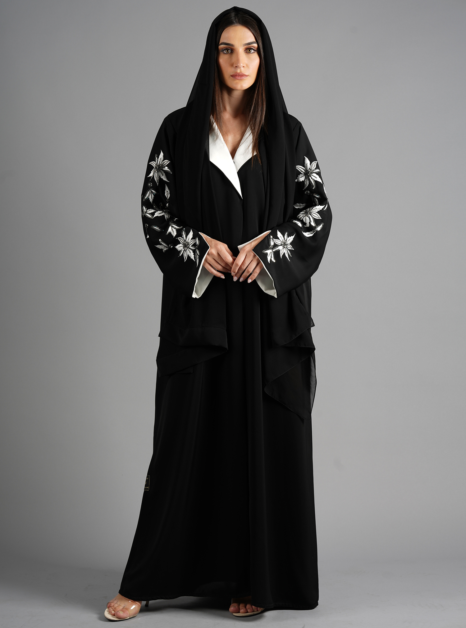 Black Flower Black abaya with floral embroidery, adorned with ...