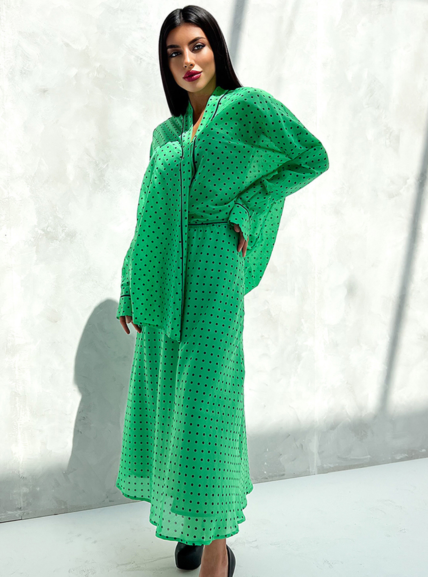 Blouse & skirt Set of loose blouse and cross cutted A-shaped skirt is ...