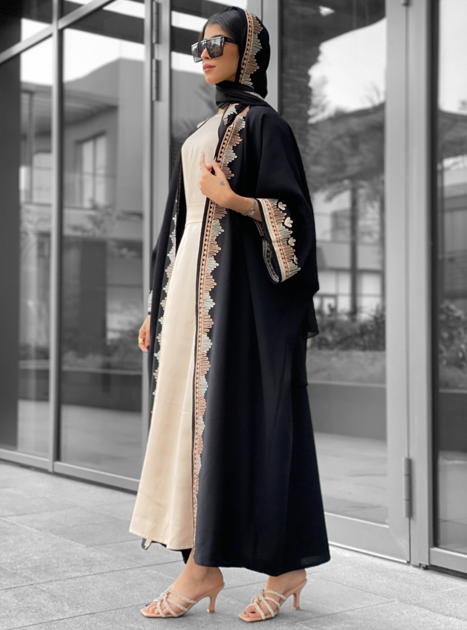 Black Set Black abaya with traditional embroidery trimmings. Comes with ...