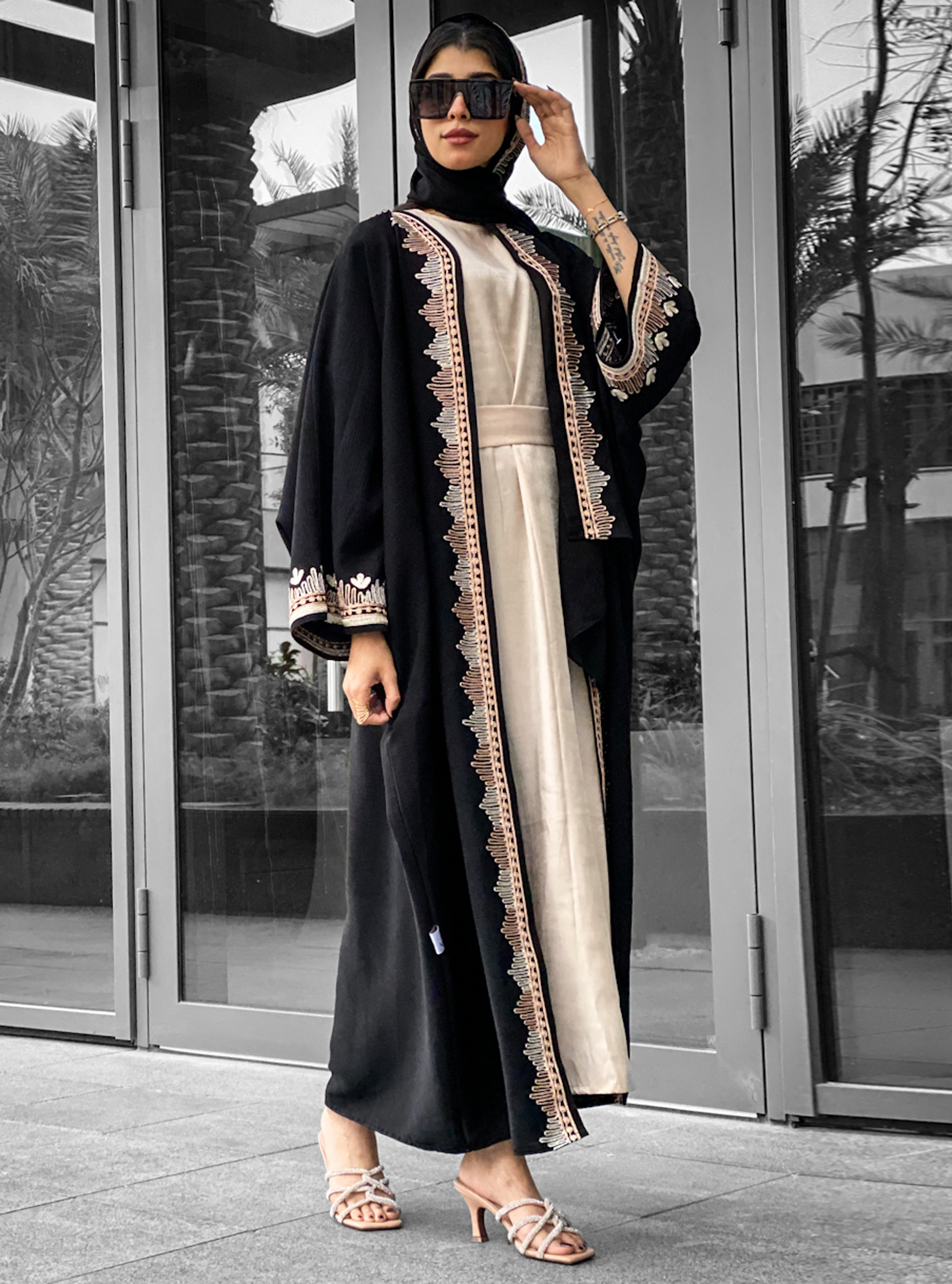 Black Set Black abaya with traditional embroidery trimmings. Comes with ...