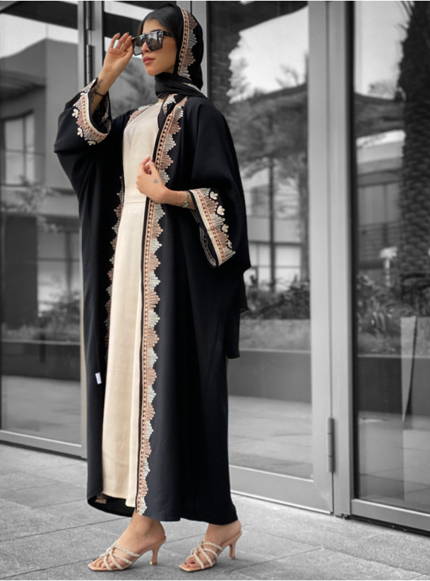 Black Set Black abaya with traditional embroidery trimmings. Comes with ...