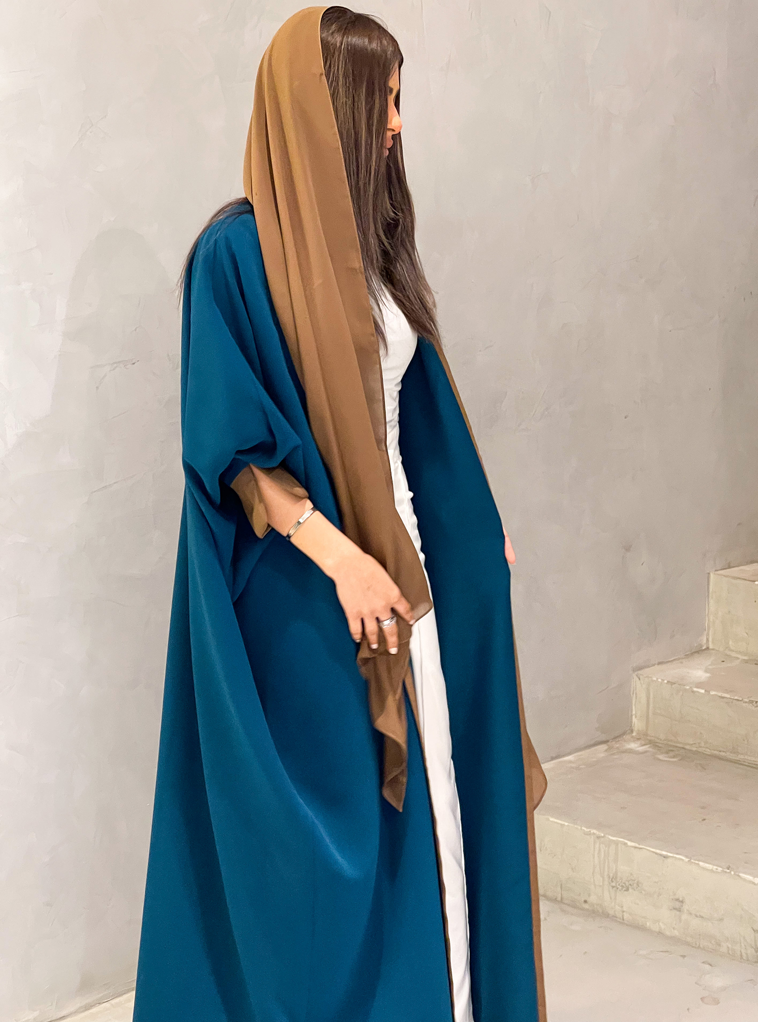 11inf Abaya Blue crepe bisht abaya with a contrast trimmings. Comes ...