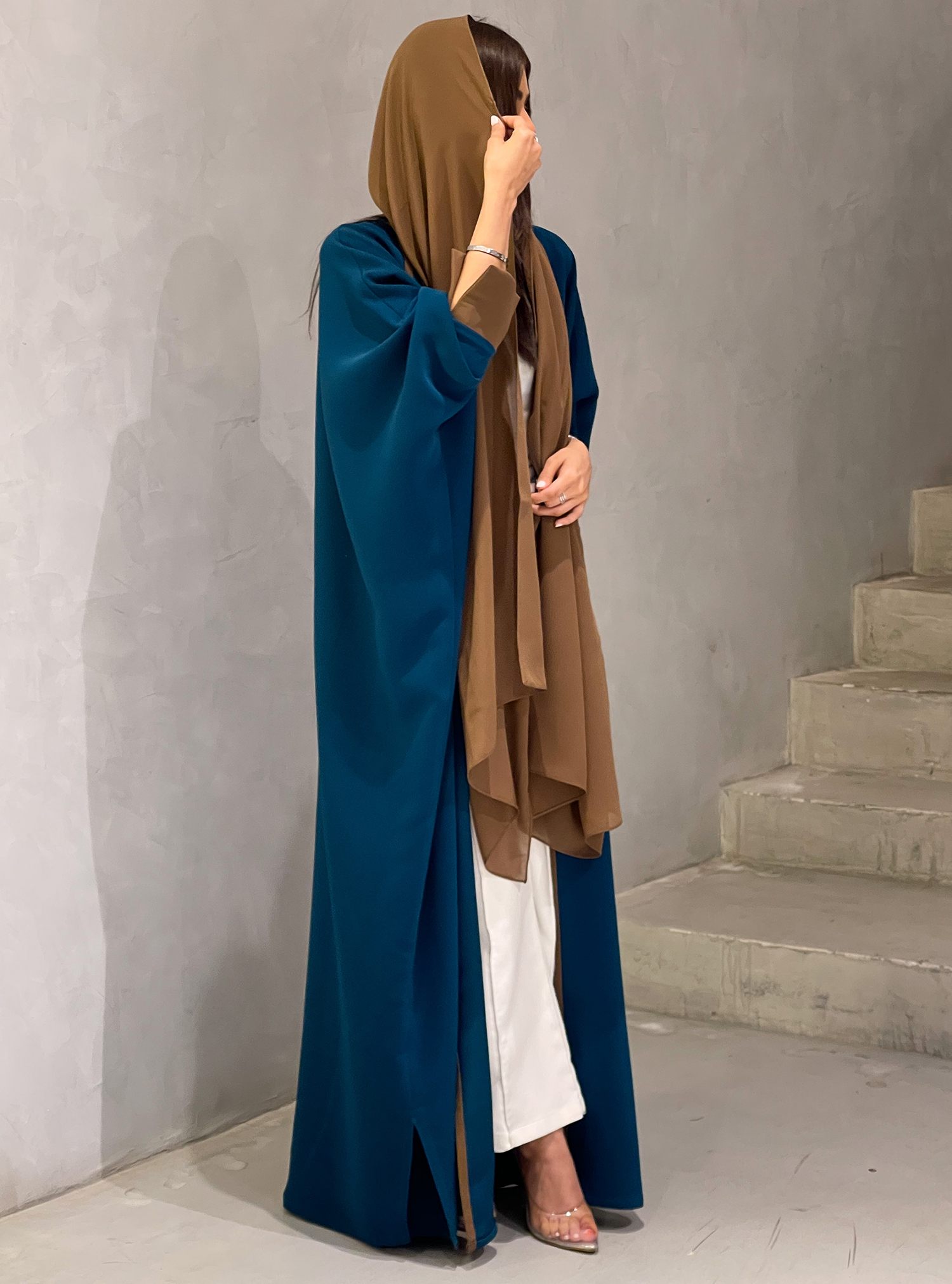 11inf Abaya Blue crepe bisht abaya with a contrast trimmings. Comes ...