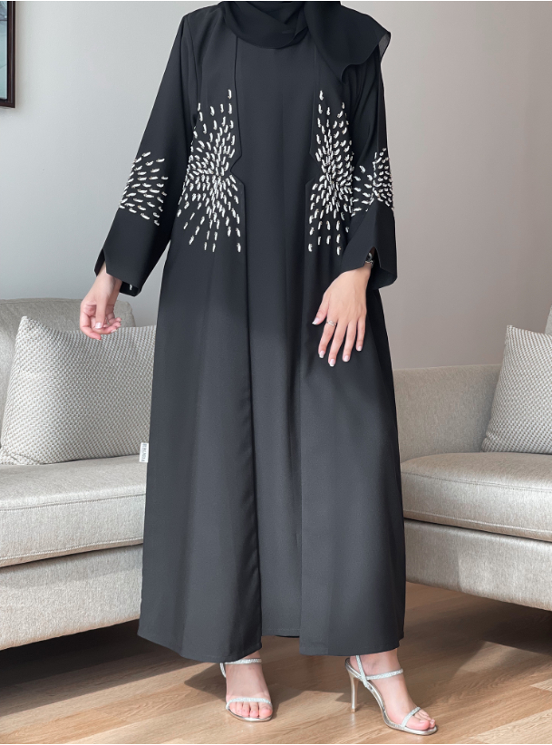 A5 Abaya Black abaya with beige embellishments. Comes with a headscarf. Abayas from By Palmera ...