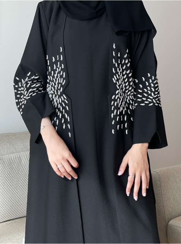 A5 Abaya Black abaya with beige embellishments. Comes with a headscarf. Abayas from By Palmera ...