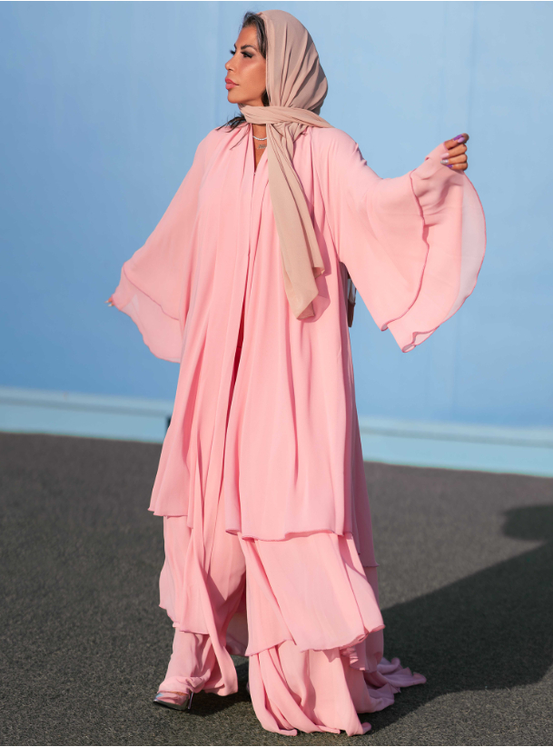 Layered Abaya Pink chiffon abaya with tiered sleeves and skirt, adorned ...