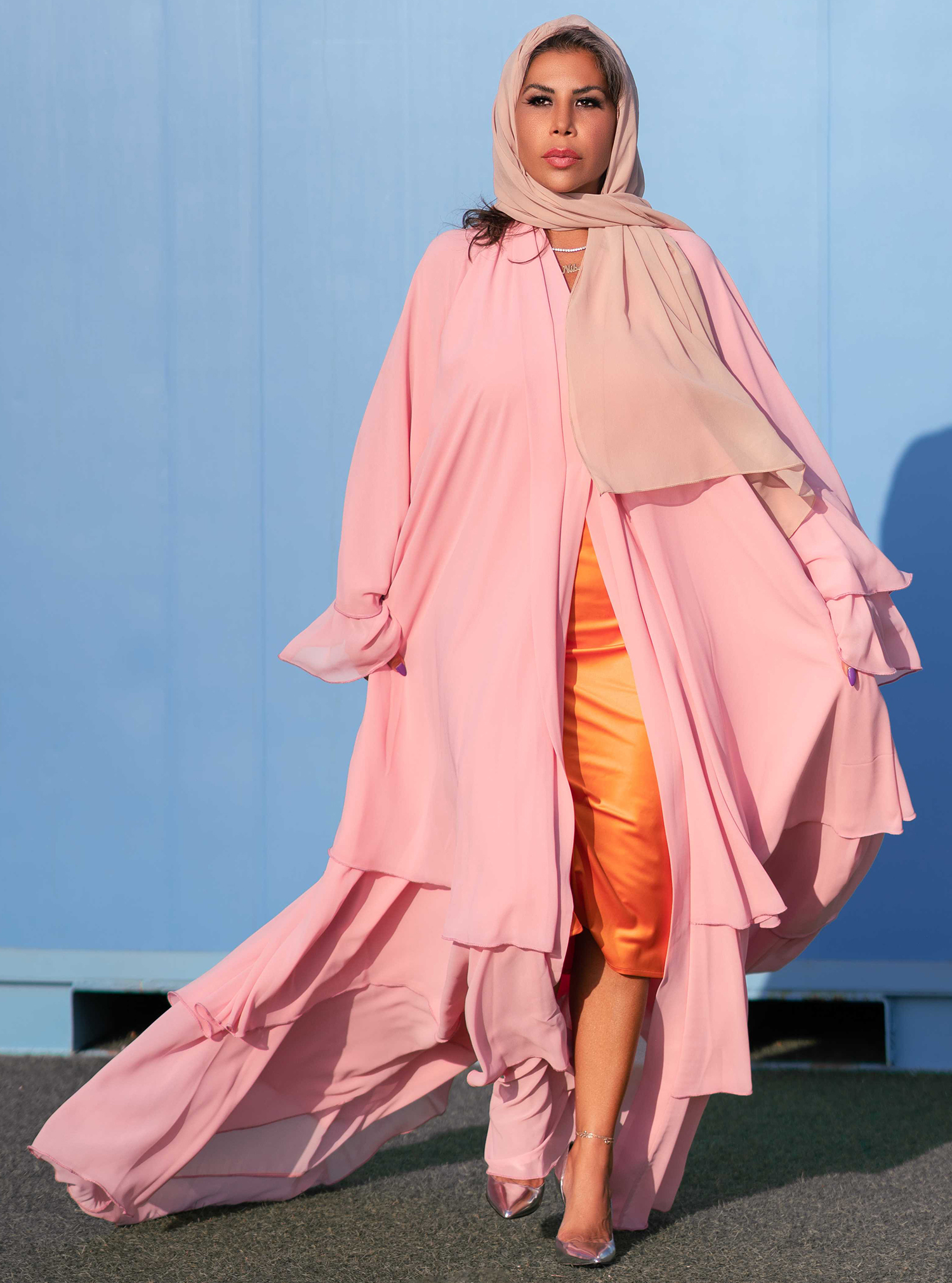 Layered Abaya Pink chiffon abaya with tiered sleeves and skirt, adorned ...