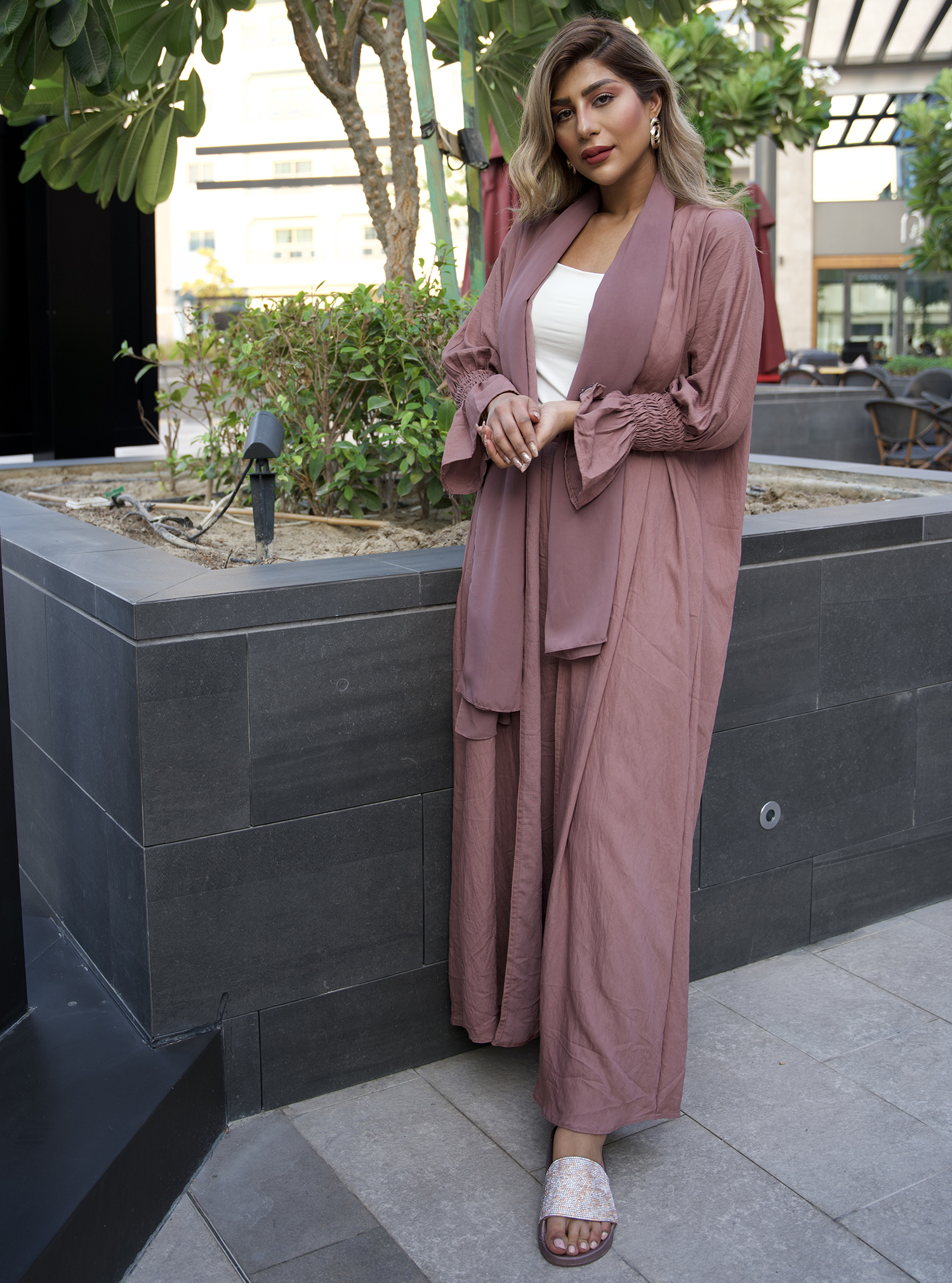 Rose abaya Dusty rose abaya with smocked sleeves. Comes with a headscarf. Abayas from Bronzed ...