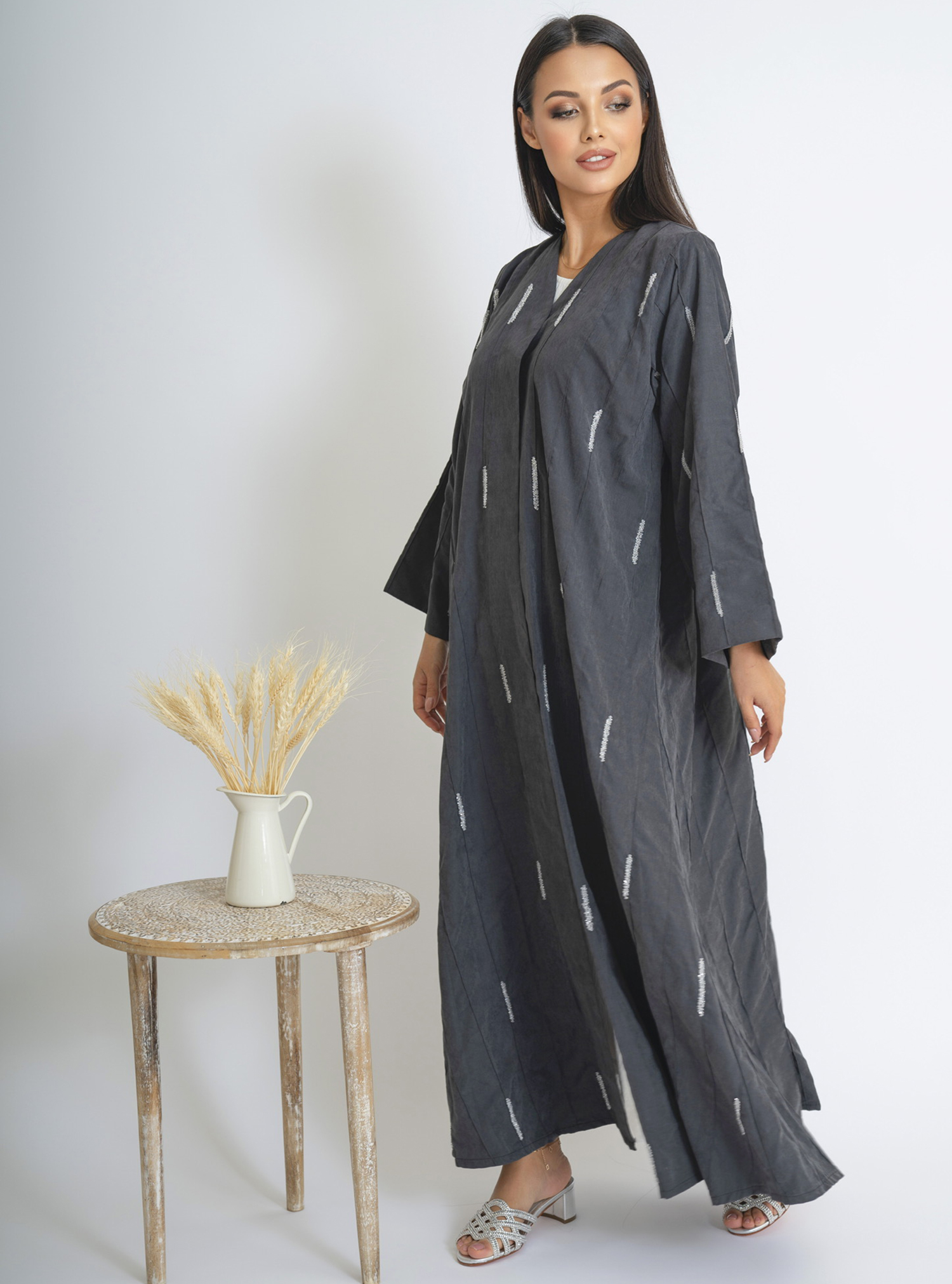 Grey abaya Grey suede abaya with embellishments. Abayas from ALIA ABAYAA at Boksha